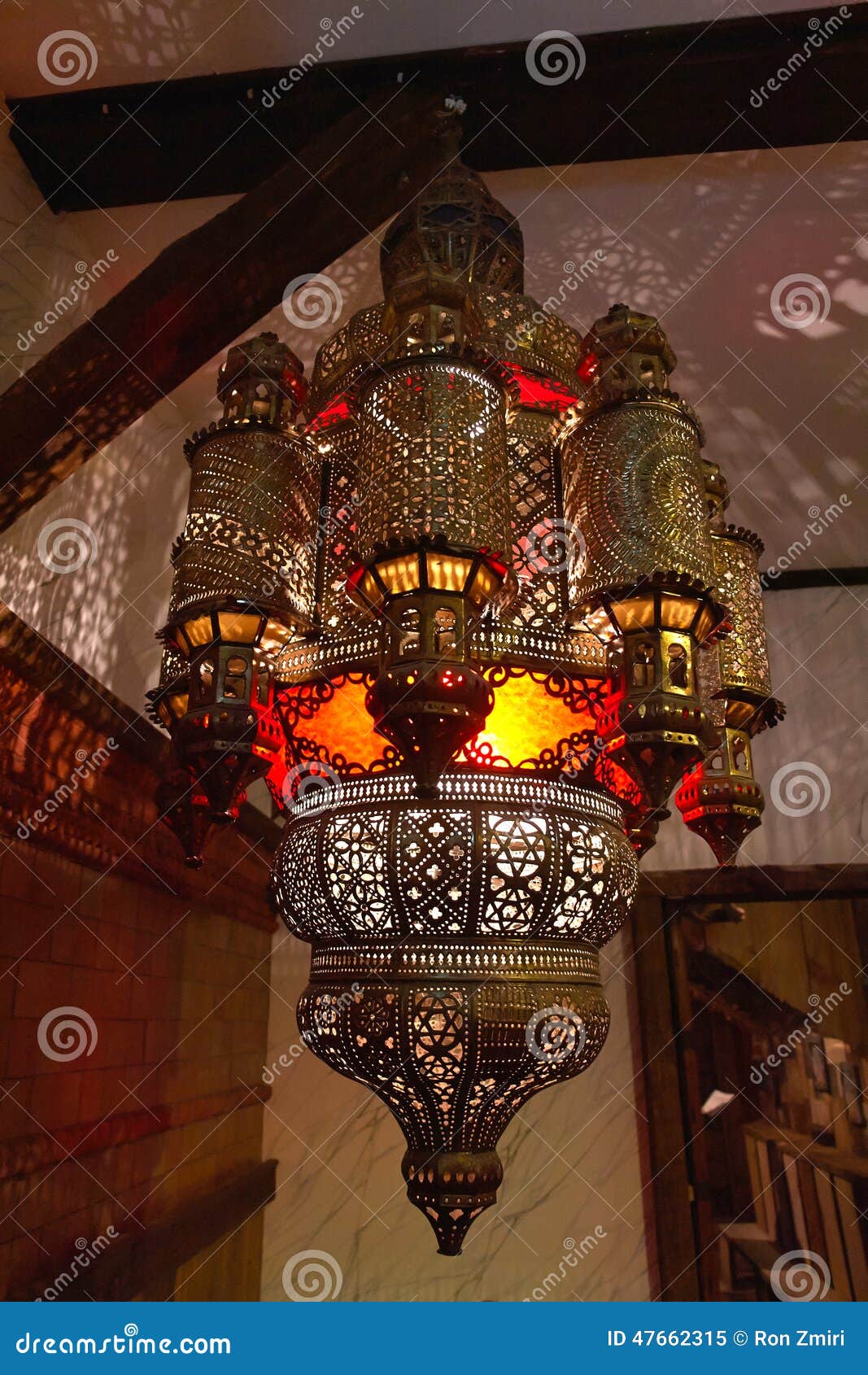 Moroccan Lantern Lamp Illuminating Patterns of Light on the Wall Stock ...