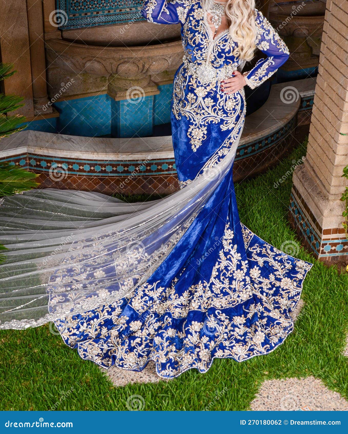 Moroccan Model Wears A Moroccan Caftan. The Caftan Is A Long, Flowing ...