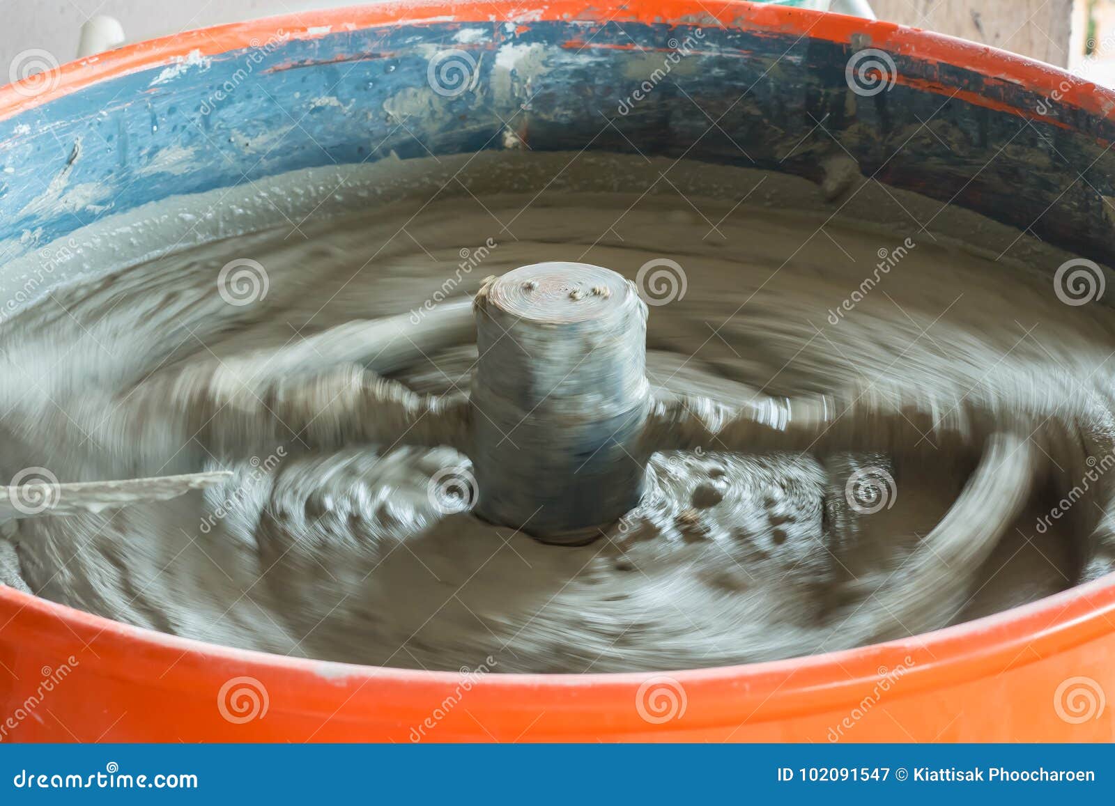 Mortar mixing in machine stock image. Image of industry - 102091547