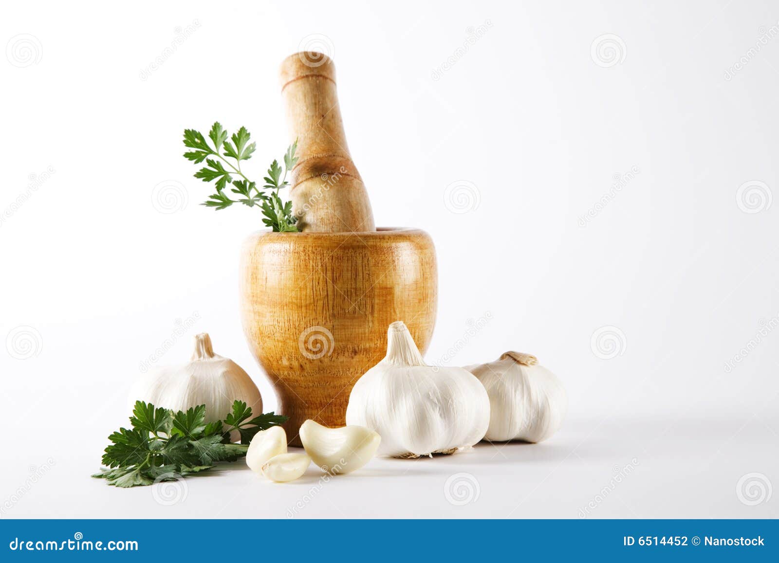 Mortar and Pestle with Garlic and Parsley Stock Photo - Image of ...