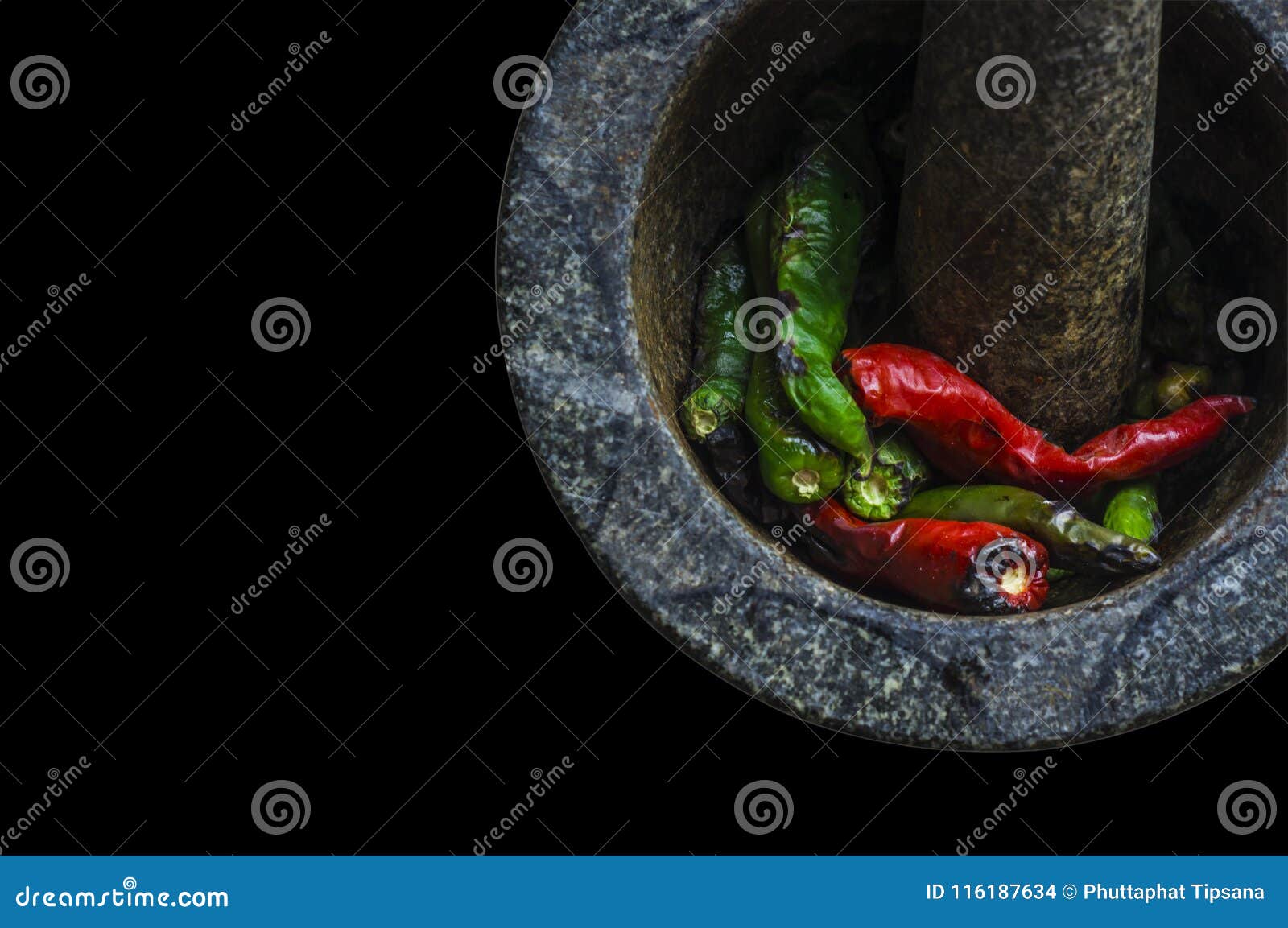 Mortar Stone with Chilli on Fire, Top View, on Black Background Stock ...