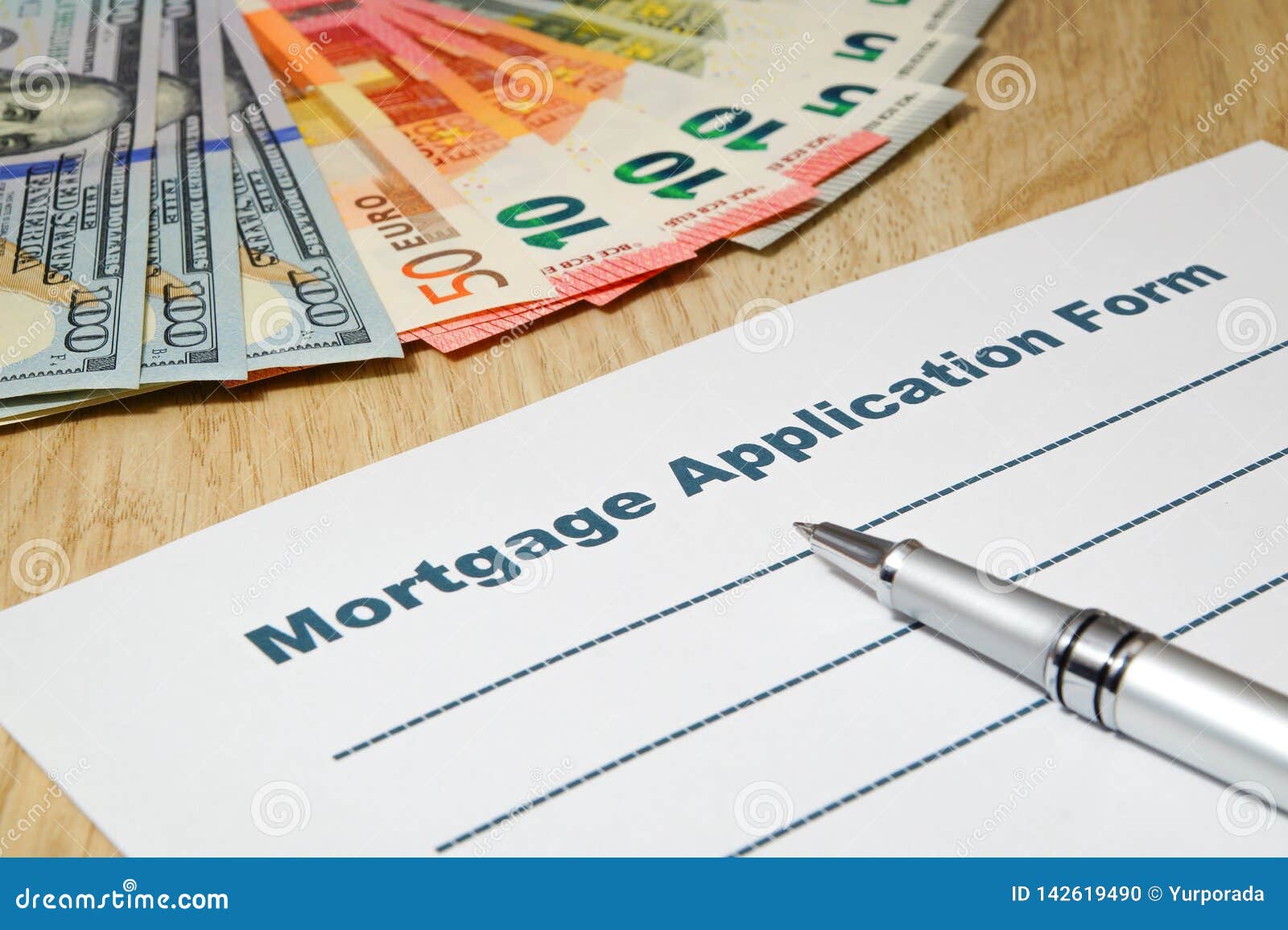 Mortgage Application Form with a Pen and Money Stock Photo - Image of ...