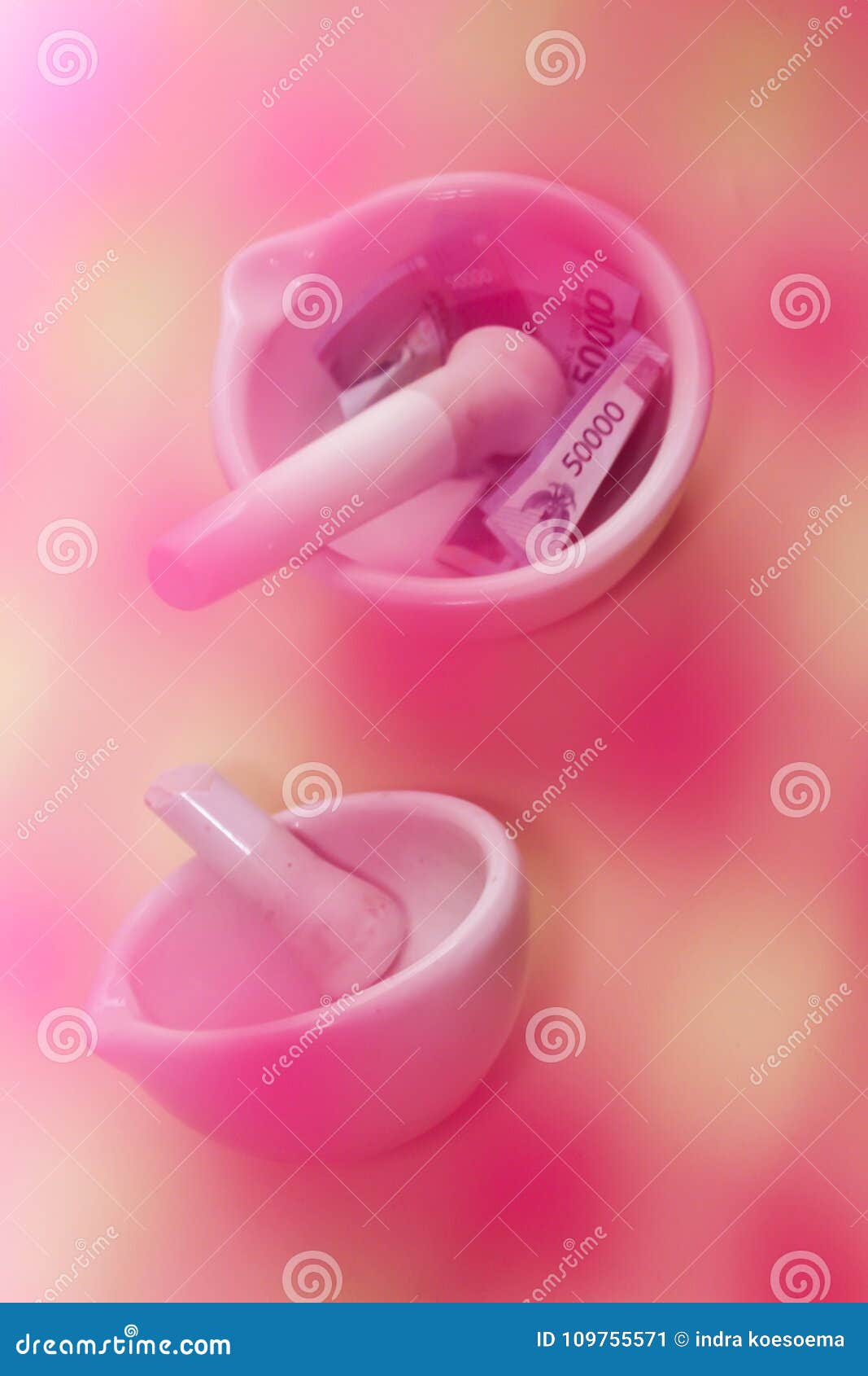 Mortir stamper and money stock image. Image of mortir - 109755571