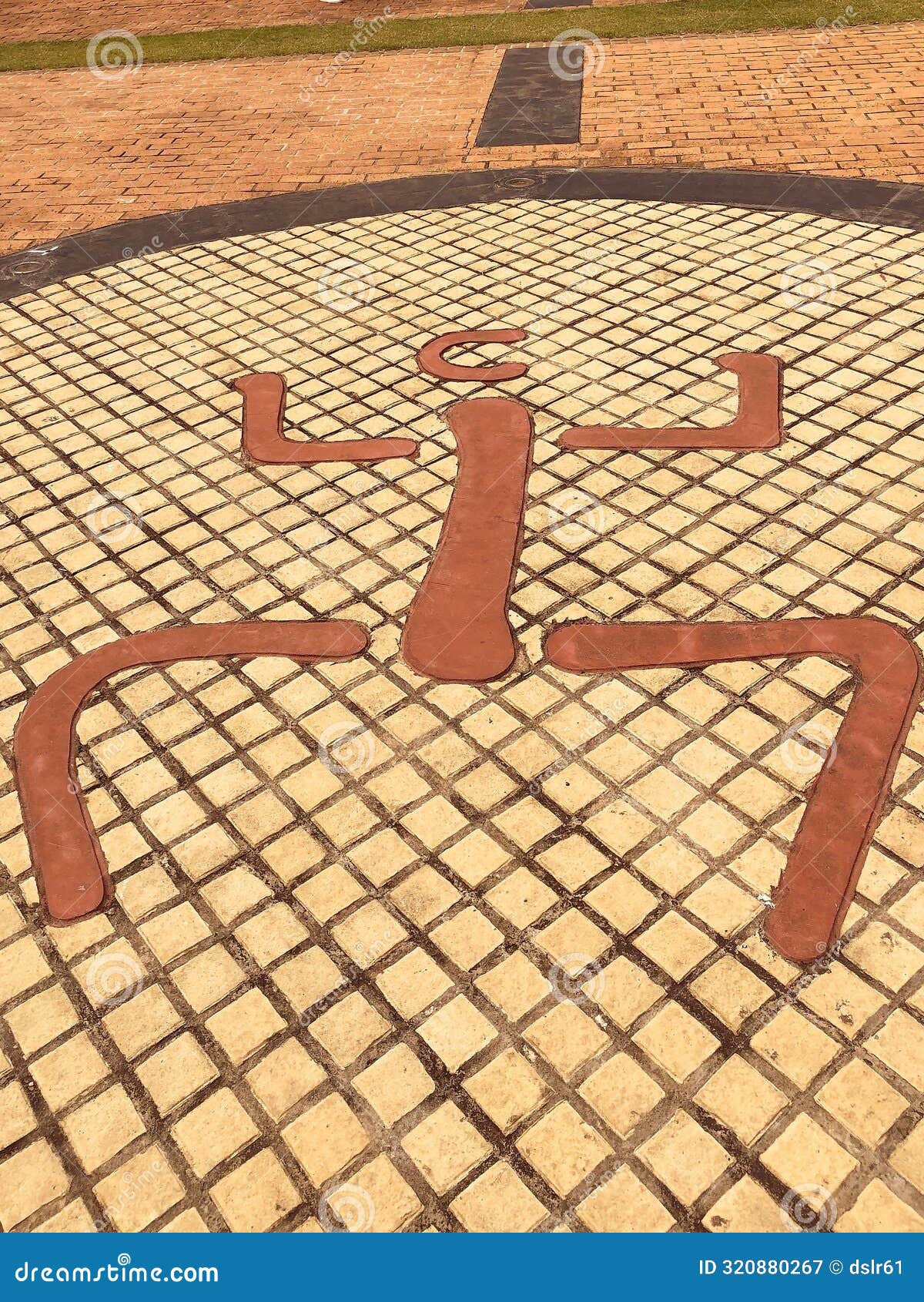 Mosaic Artwork of a Stylized Human Figure on the Ground Stock Image ...