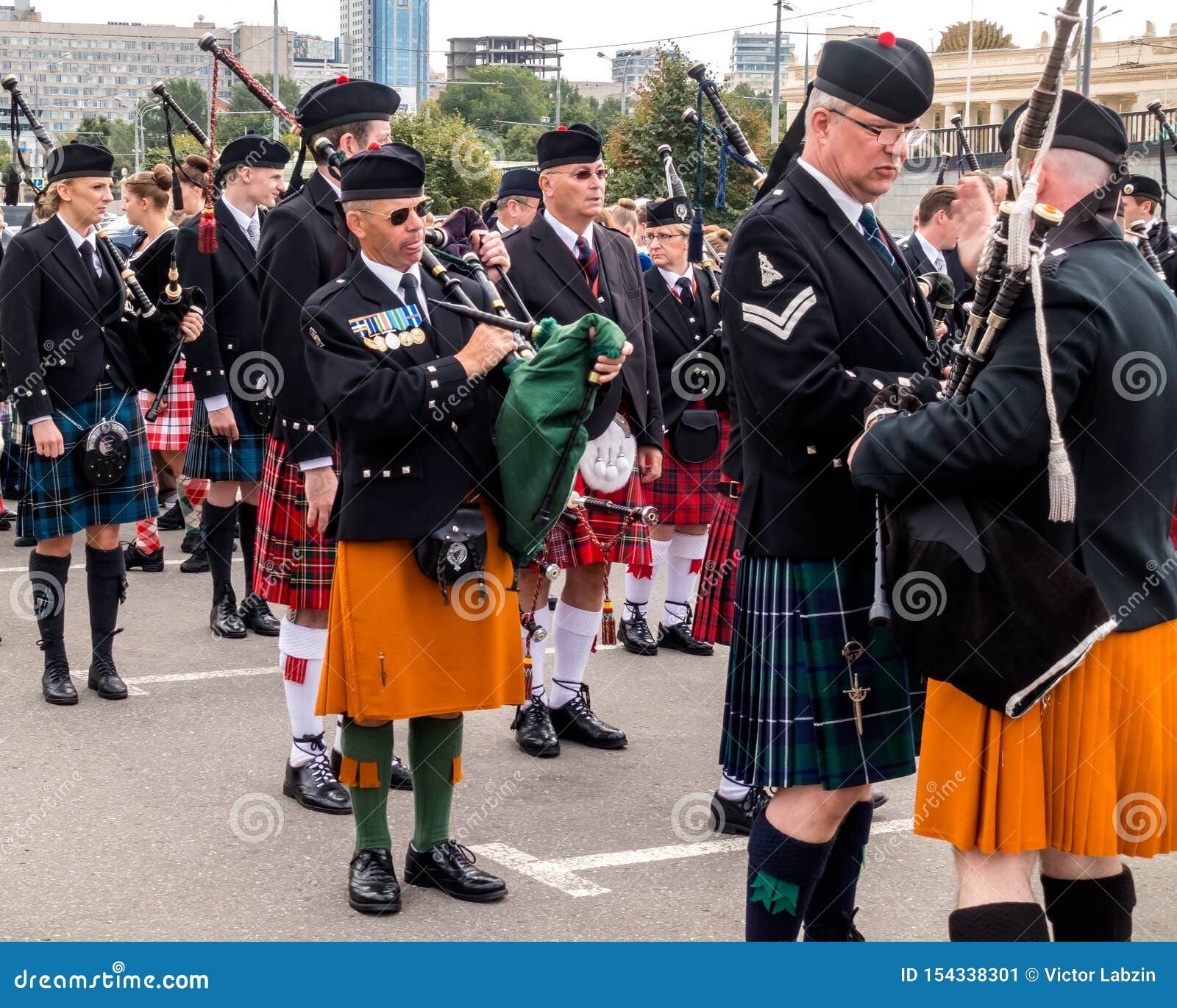 A Group of Scottish Pipers Preparing for the Parade Editorial Photo ...