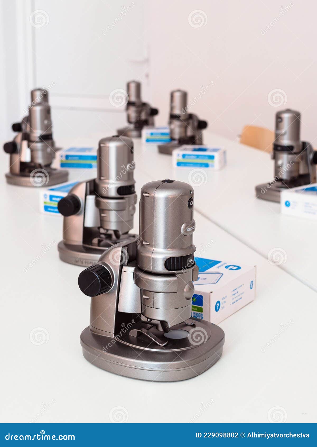 Digital Microscopes DIGITAL BLUE QX7 on the Tables in the Classroom ...