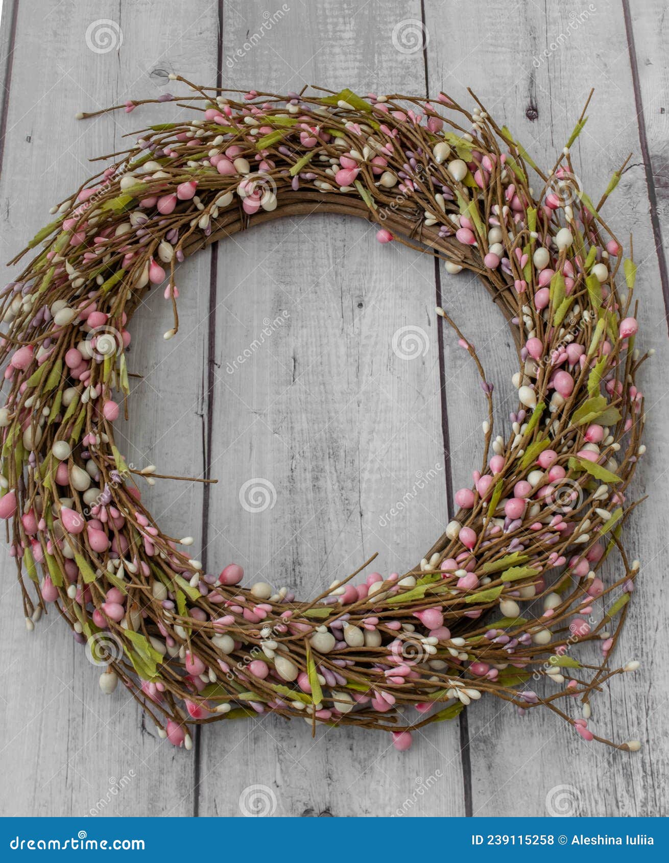 A Wreath of Spring Branches on a White Board Table Stock Photo - Image ...