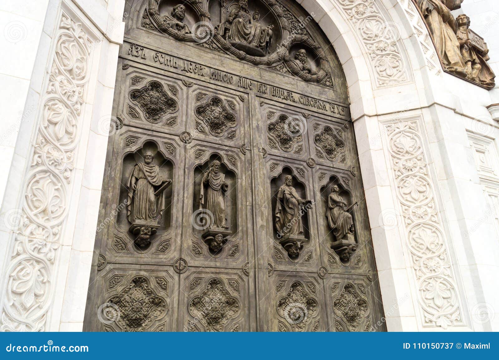 The Figures of Priests on the Doors Stock Image - Image of downtown ...