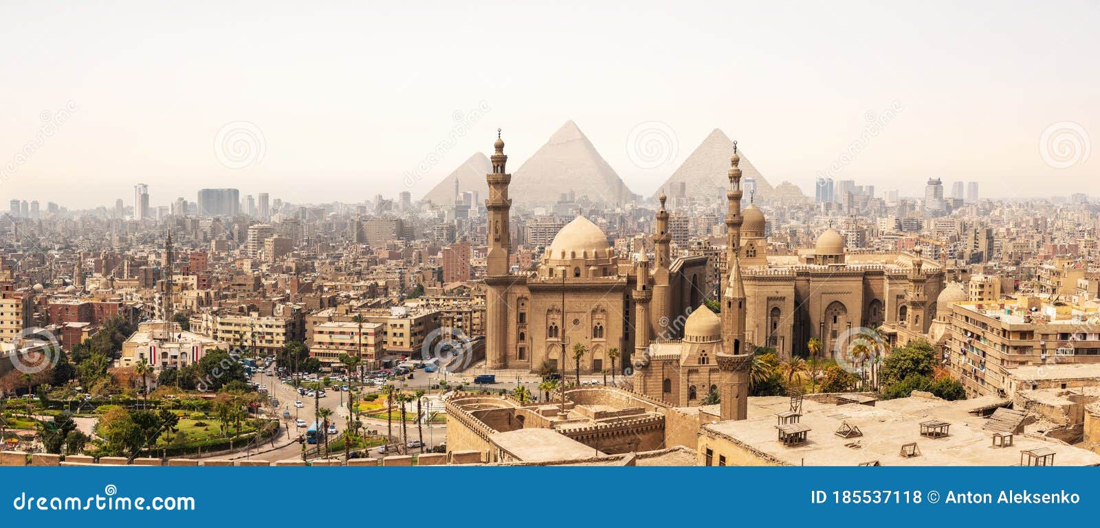 The Mosque-Madrassa of Sultan Hassan in Front of the Giza Pyramids ...