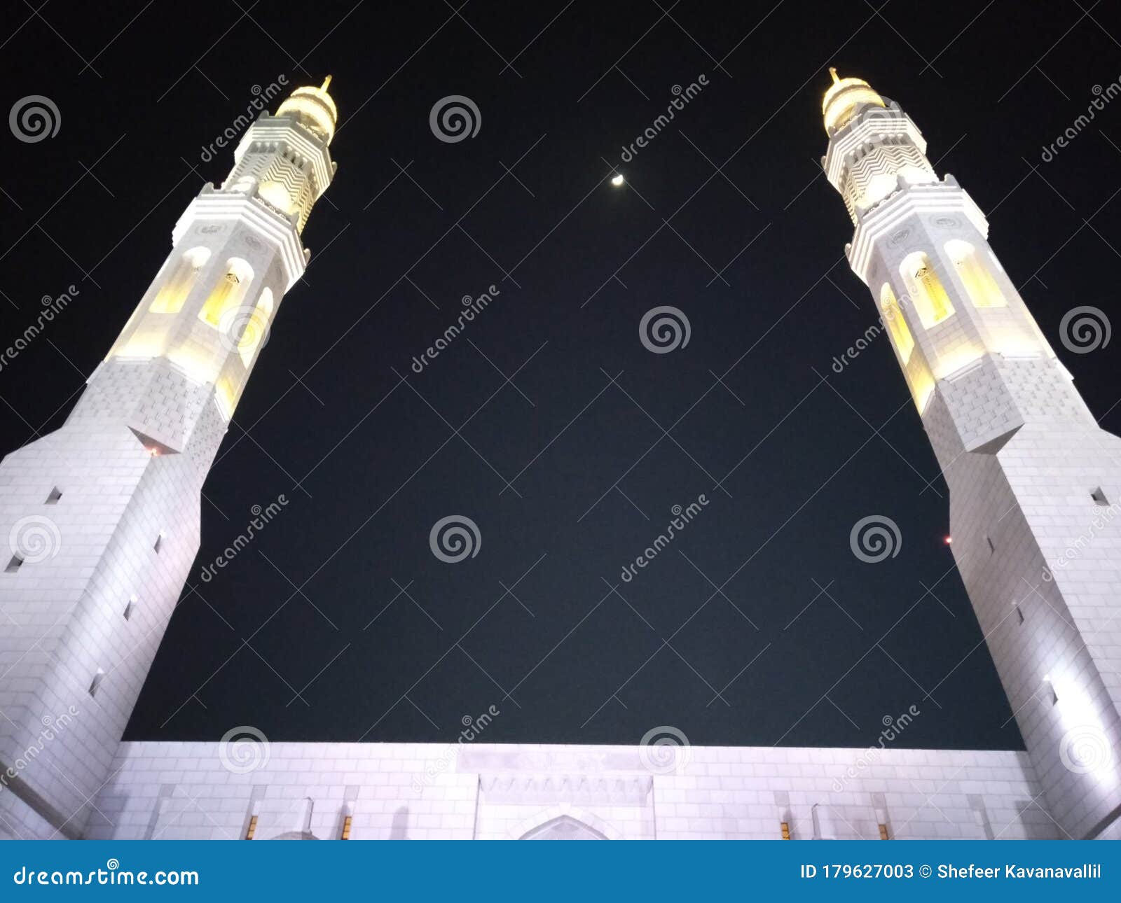 Mosque Minar with moon editorial stock photo. Image of yellow - 179627003