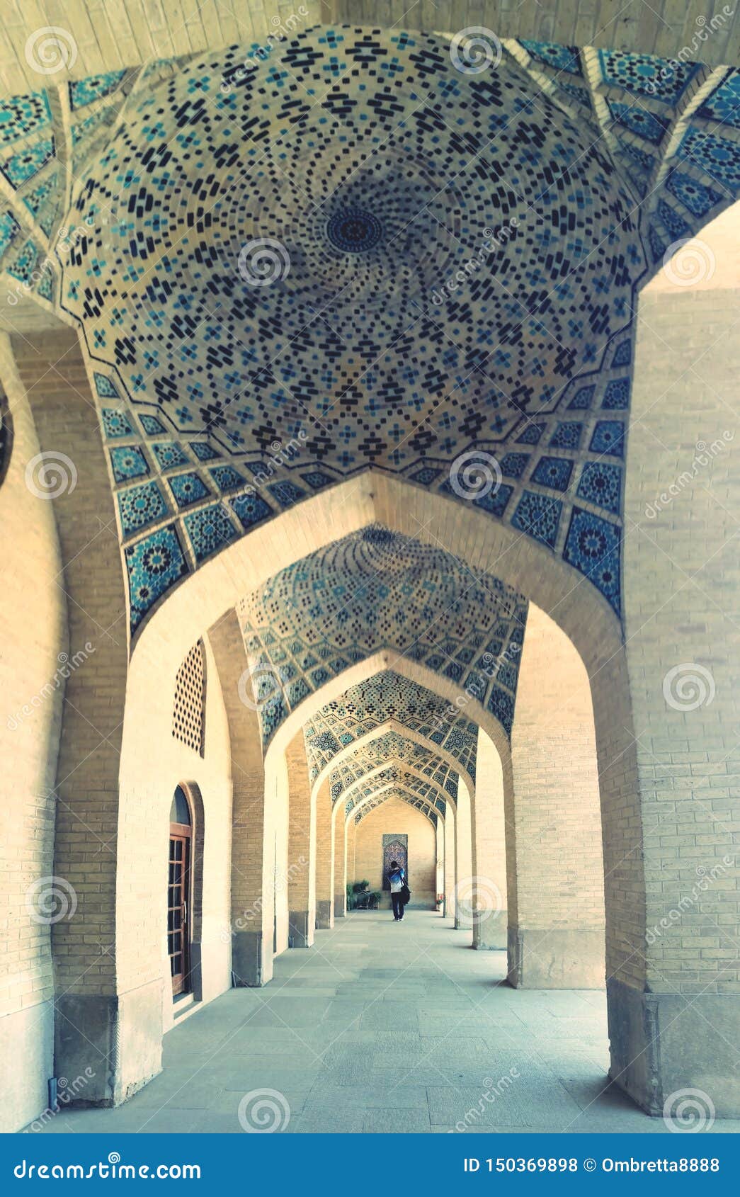 Corridor of a Mosque in Irdecorata with Blue Ceramics and High Arches ...