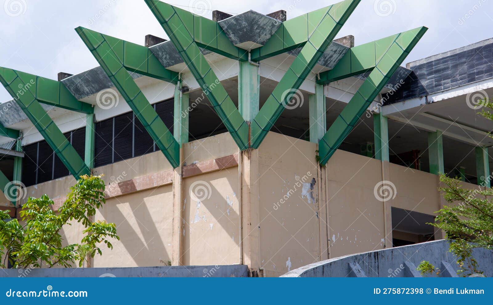 Mosque with Sharp Triangular Pillars Above the Building Stock Photo ...
