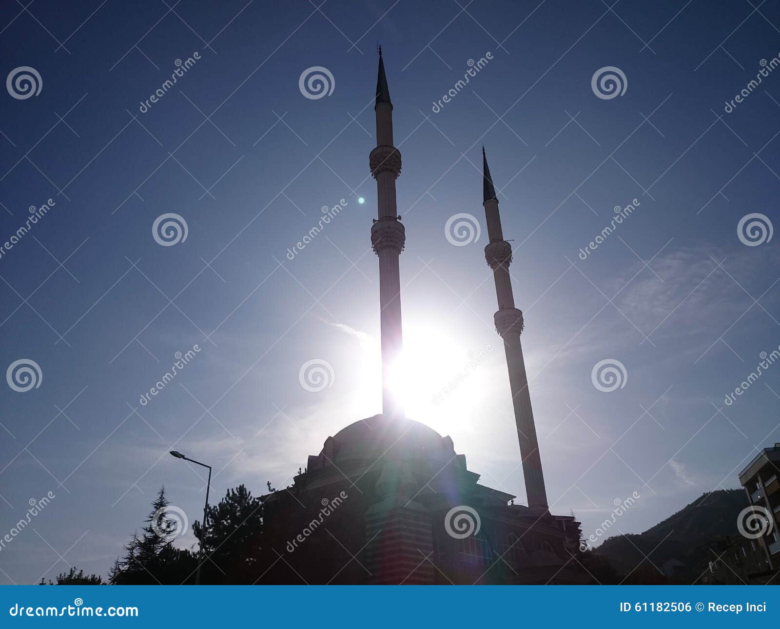 Mosques and sun stock photo. Image of minarets, mosques - 61182506