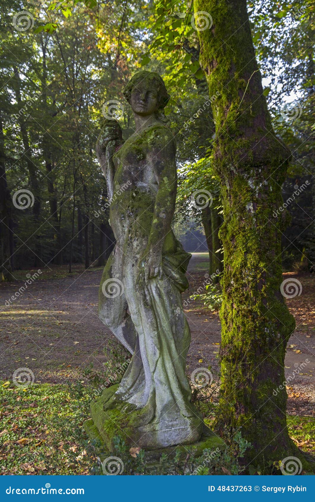 Moss-covered Stone Statue in the Old Park. Stock Image - Image of aged ...
