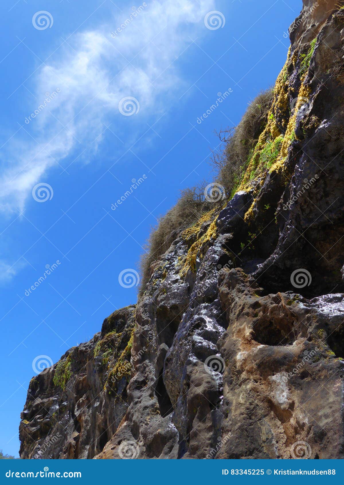 Mossy Oceanside Cliff stock image. Image of ocean, formation - 83345225