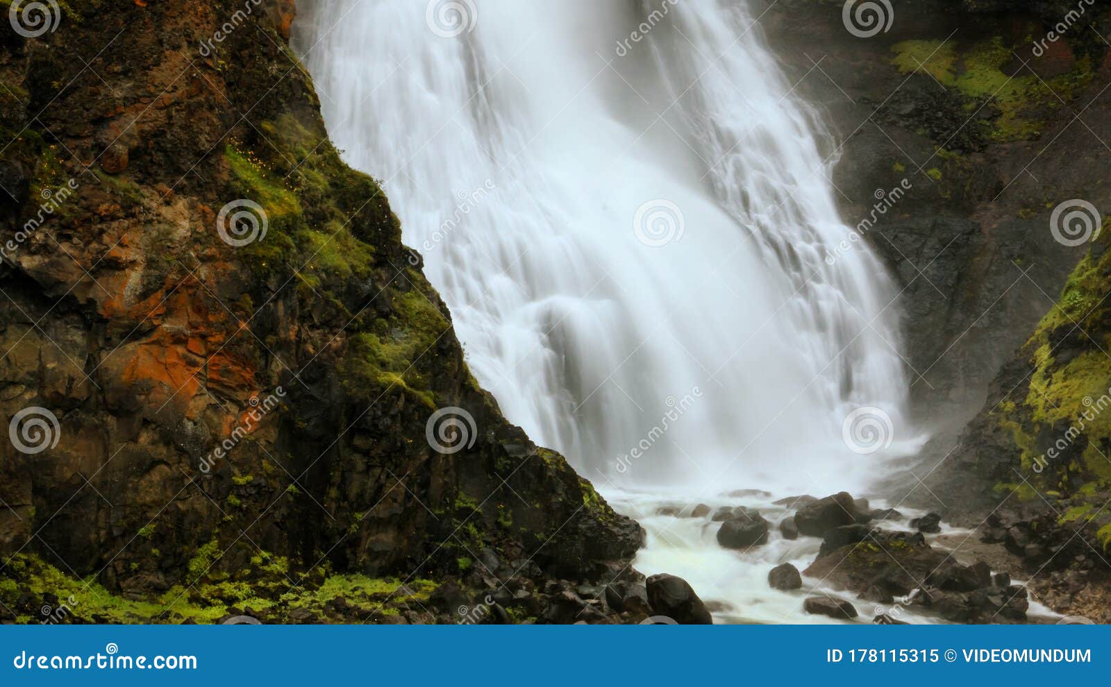 Mossy Ravine with Waterfall Inbetween Volcanic Rock Stock Image - Image ...