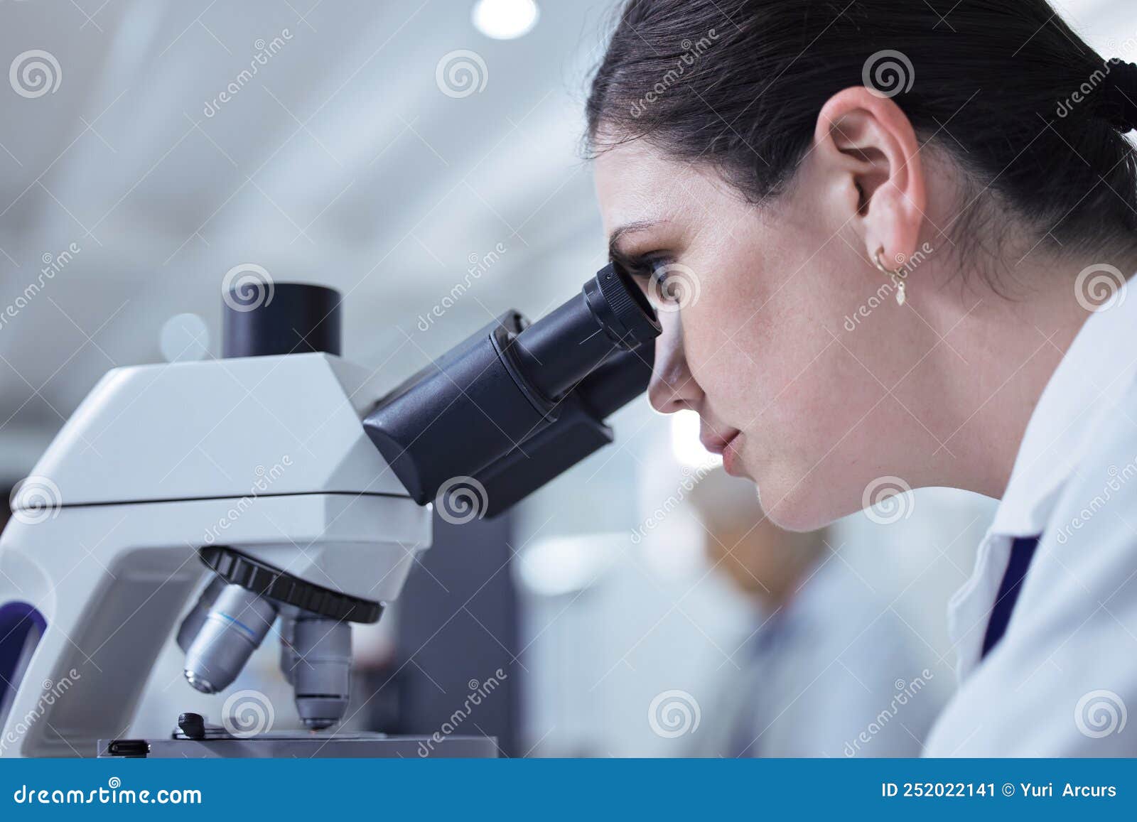 The Most Important Discovery of Her Time. a Young Female Lab Tech Using ...