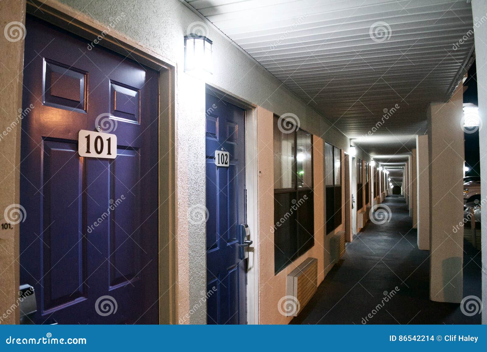 Motel Doors and Walkway at Night Stock Photo - Image of walkway, motel ...