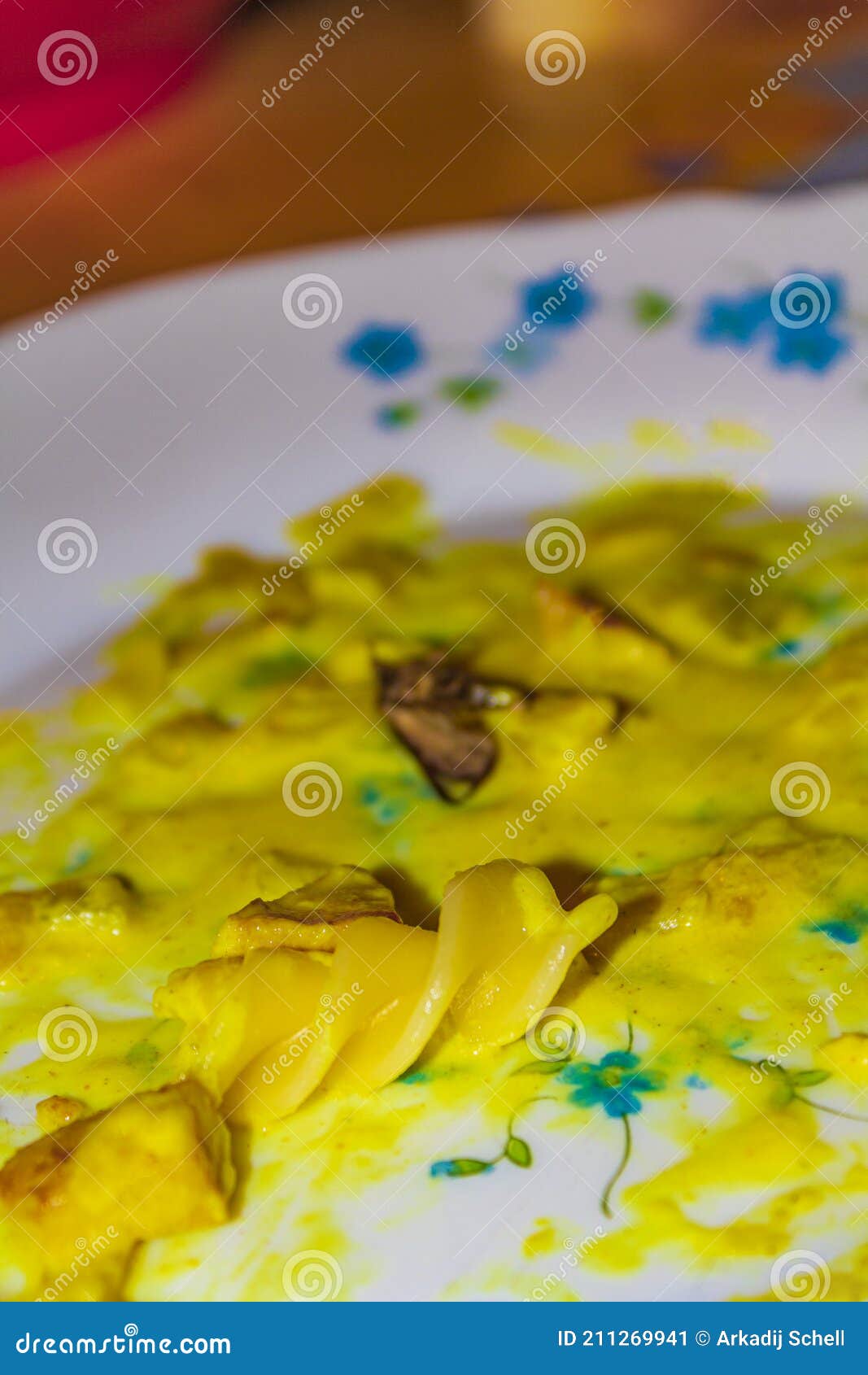 Moth Insect in Food Curry Sauce with Pasta on Plate Stock Image - Image ...