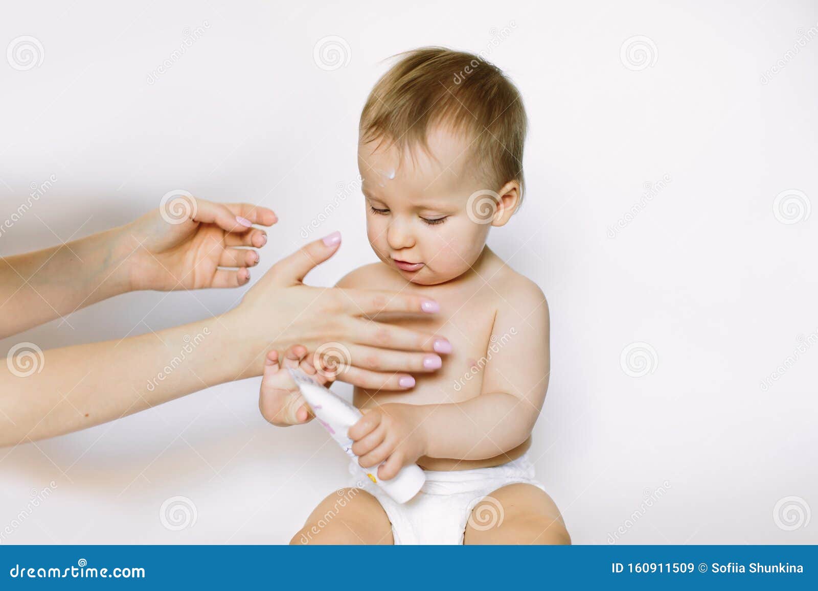 Mother Applying Cream on Baby after Bathing in Room Stock Image - Image ...