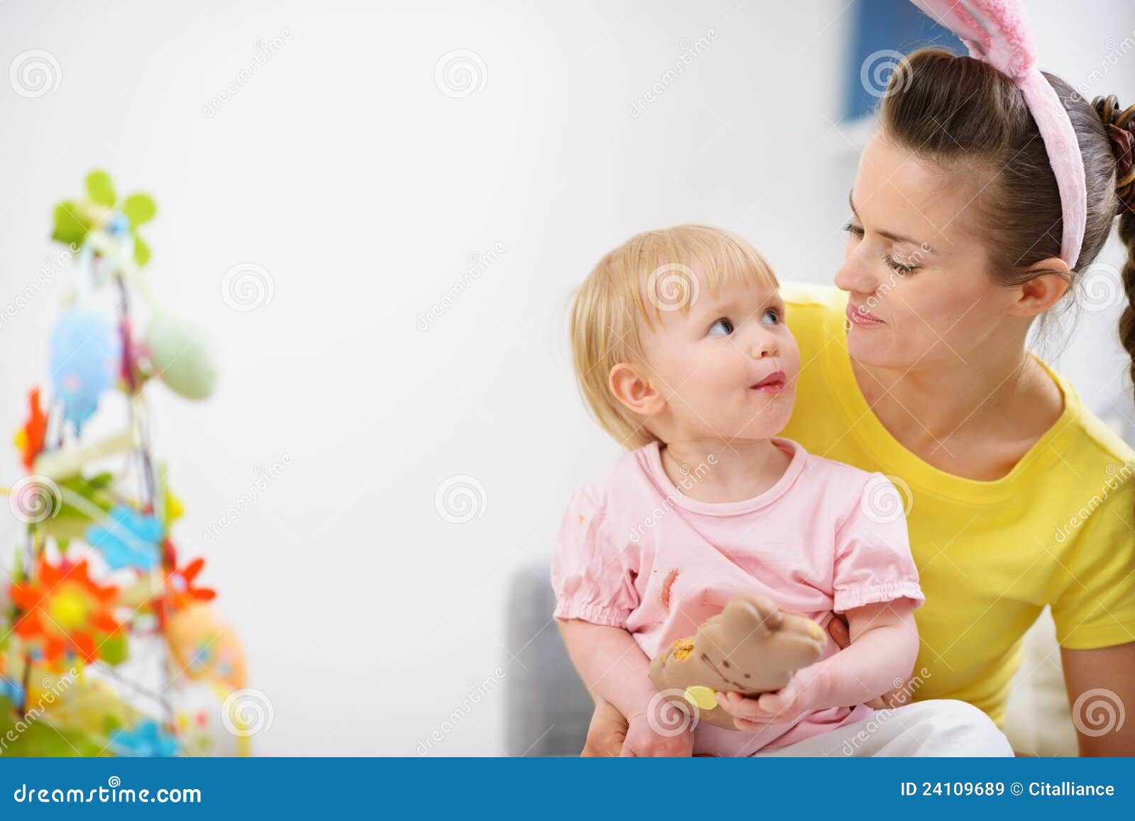 Mother and Baby Eating Easter Rabbit Cookie Stock Image - Image of ears ...