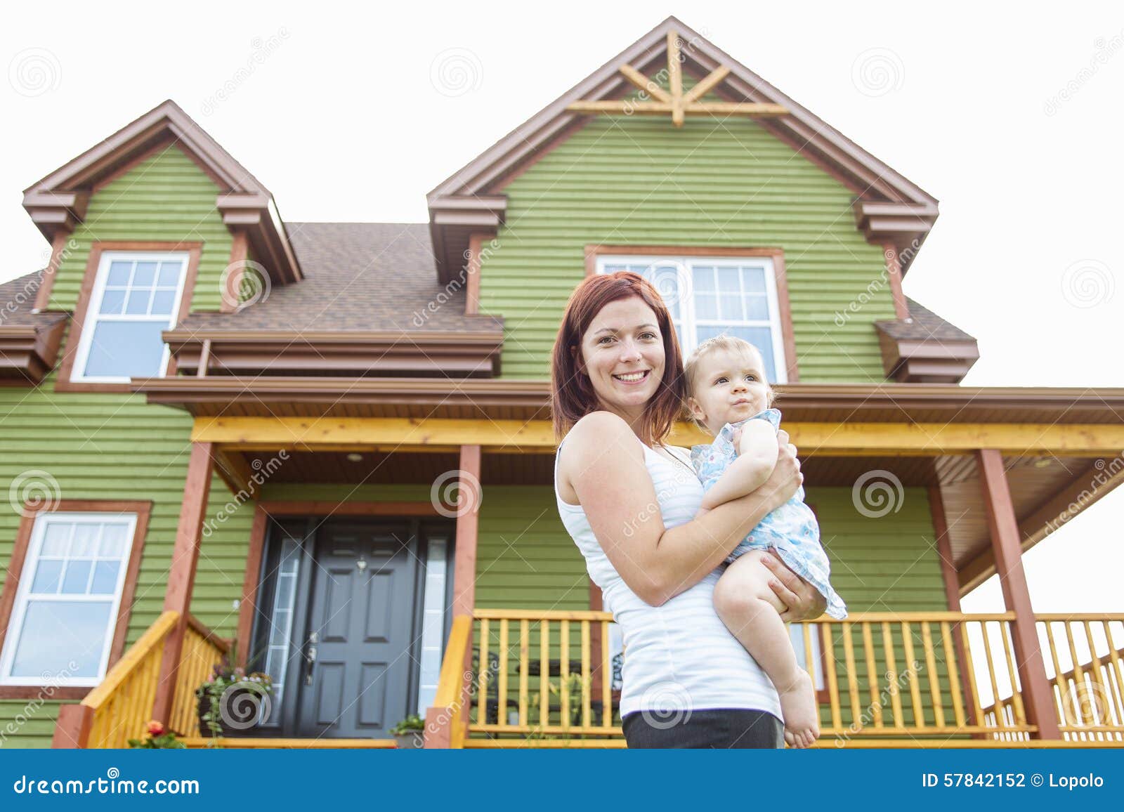 Mother and Baby in Front of the House Stock Photo - Image of home, girl ...