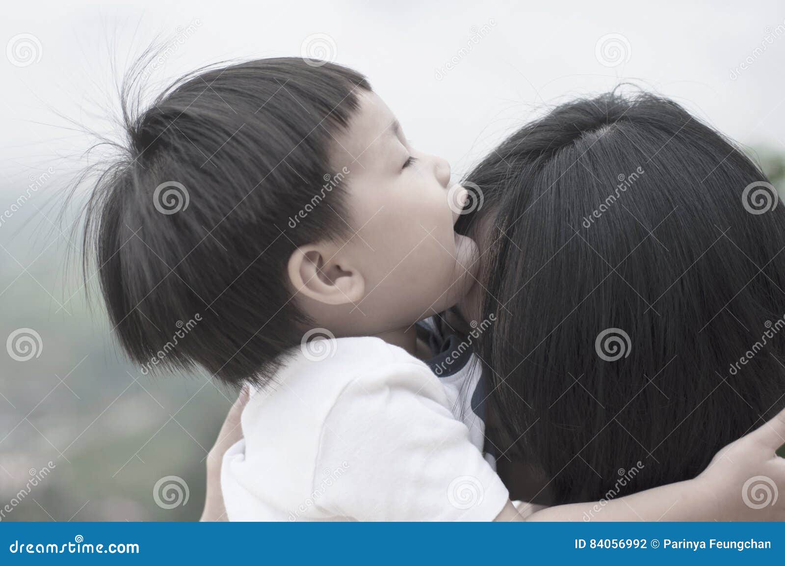 Mother and baby hugging stock photo. Image of cute, young - 84056992