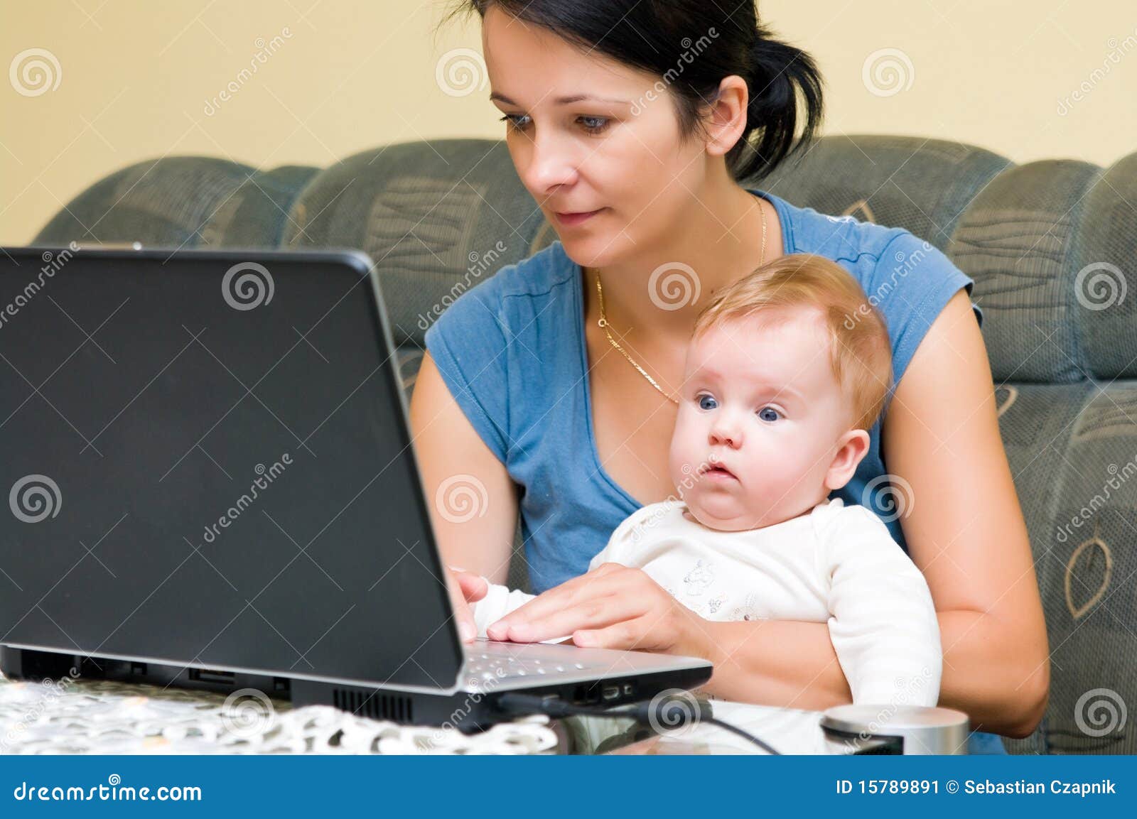 Mother, baby and laptop stock image. Image of housewife - 15789891