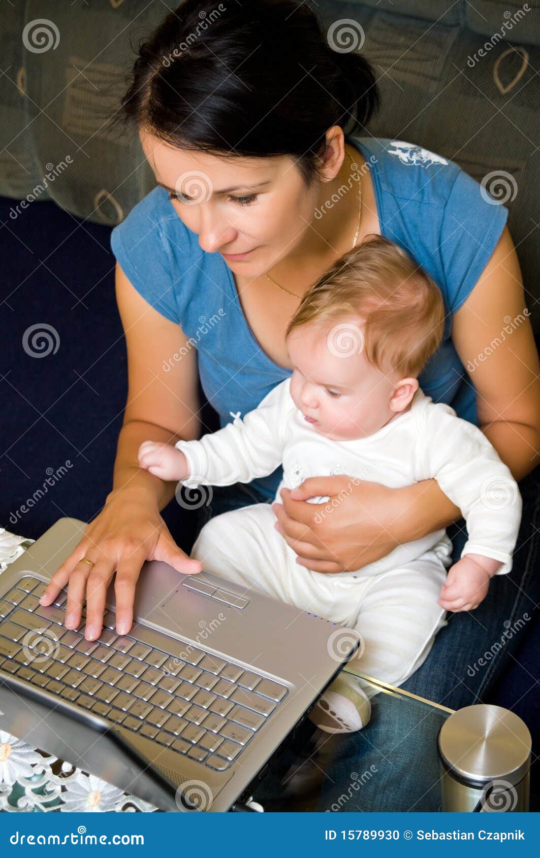 Mother, baby and laptop stock photo. Image of surf, hold - 15789930