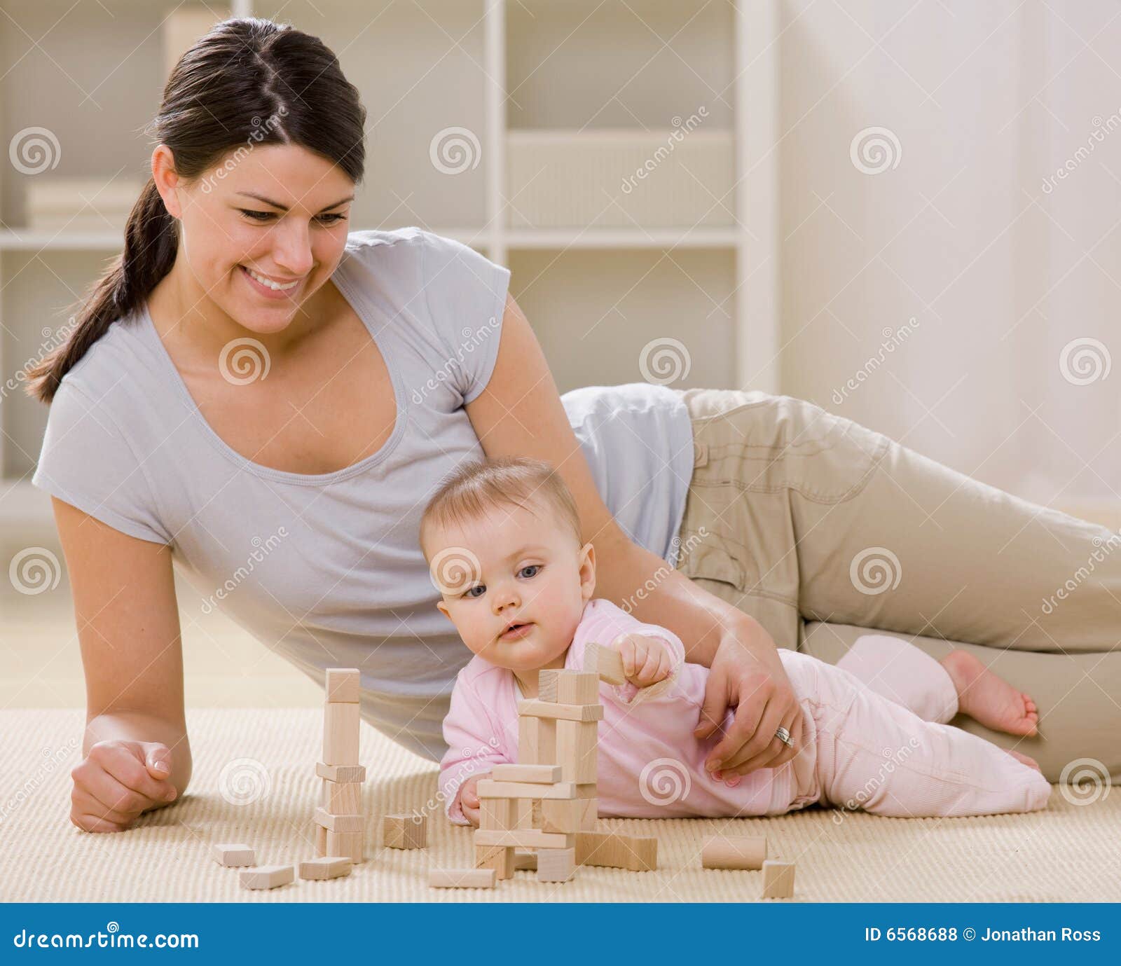 Mother and Baby Playing with Wooden Blocks Stock Photo - Image of ...