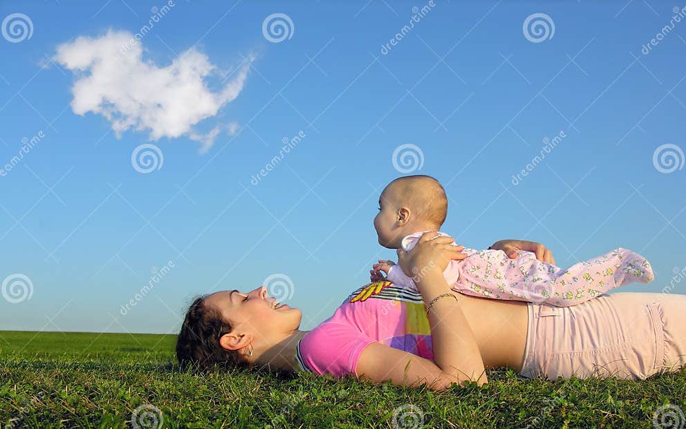 Mother with baby on sunset stock image. Image of freedom - 721413