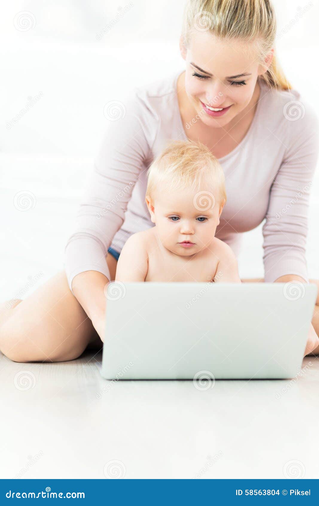 Mother and Baby Using Laptop Stock Photo - Image of expression, happy ...