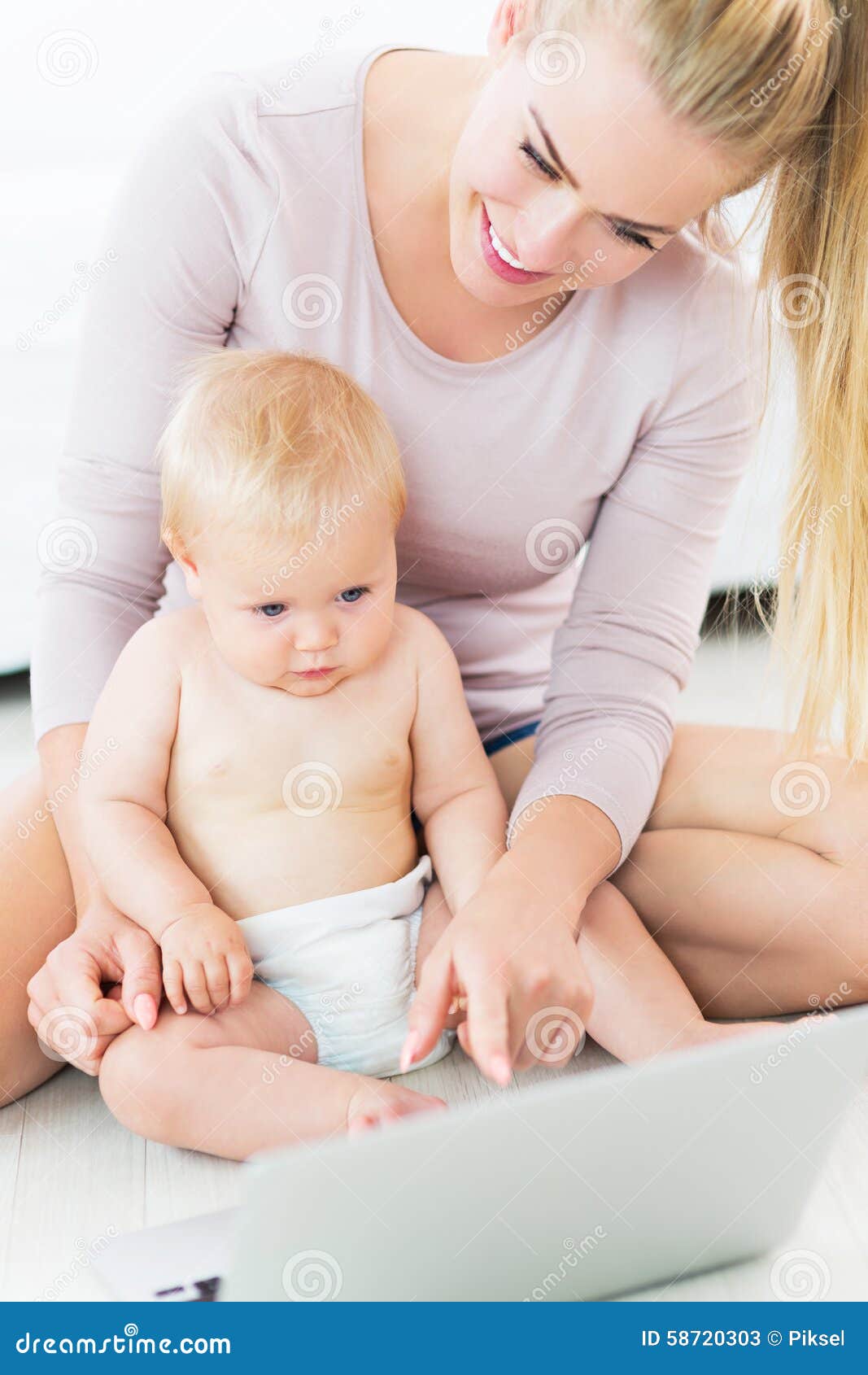 Mother and Baby Using Laptop Stock Image - Image of expression ...