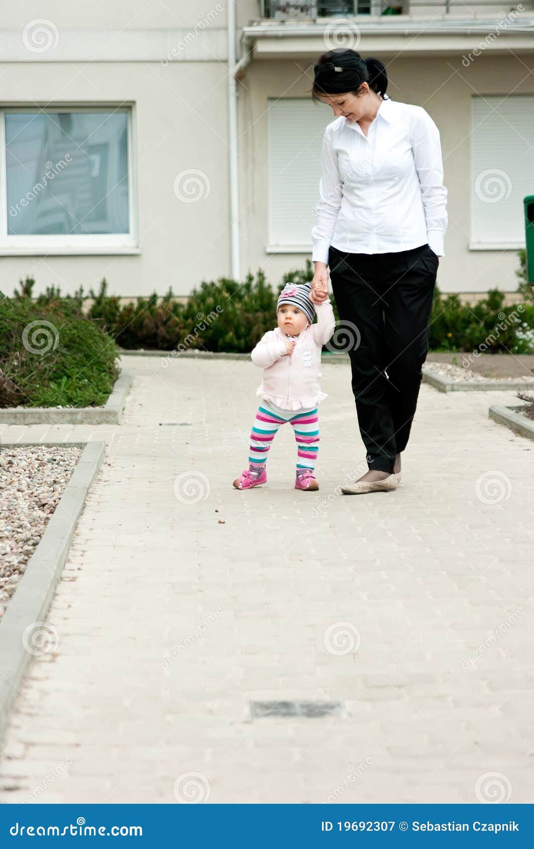 Mother and baby walk stock image. Image of walk, hand - 19692307