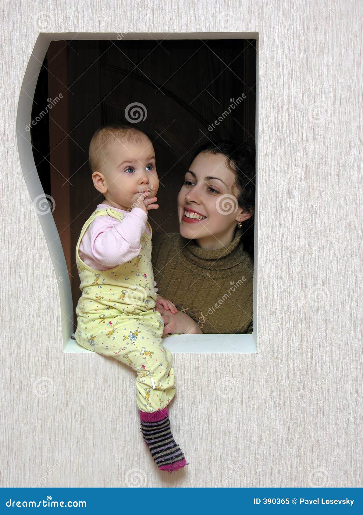 Mother with baby in window stock image. Image of wall, female - 390365