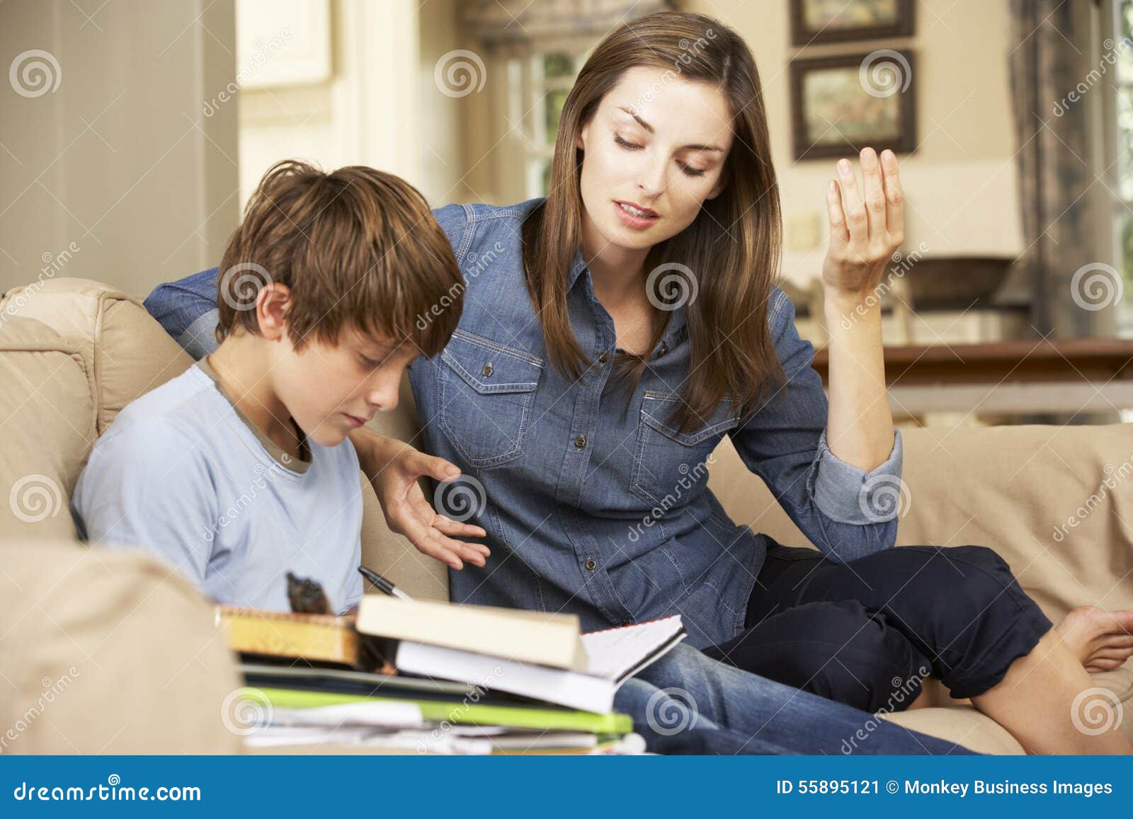 Mother Becoming Frustrated with Son Whilst Doing Homework Sitting on ...