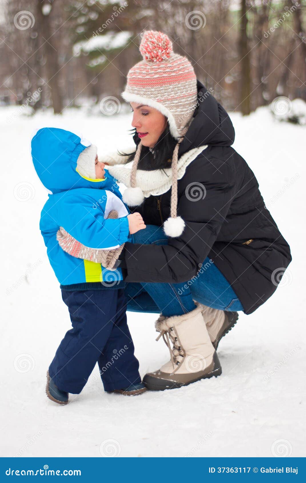 Mother Caring Her Baby Boy in Winter Stock Image - Image of playing ...