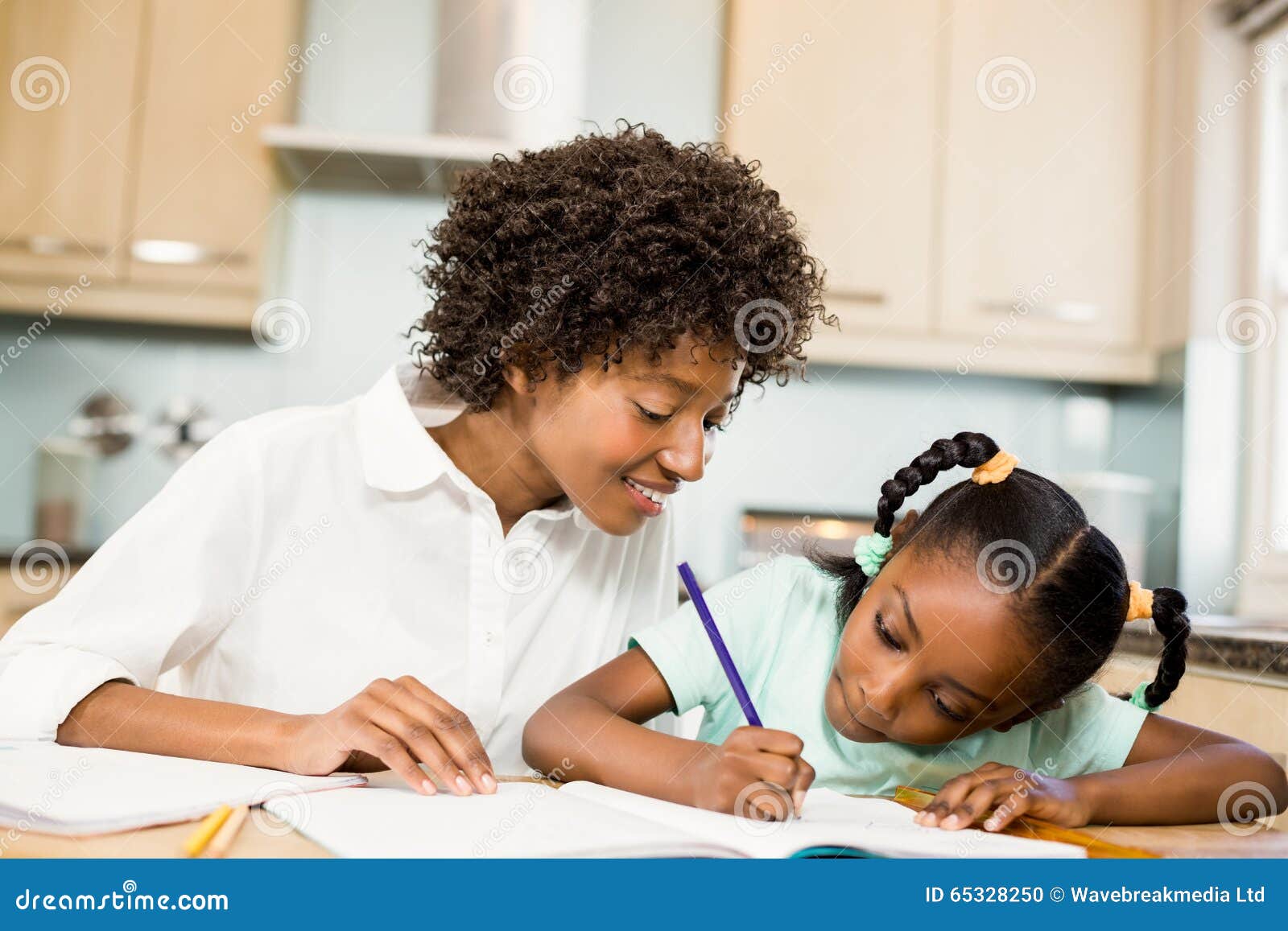 Mother Checking Daughters Homework Stock Photo - Image of cute, girl ...