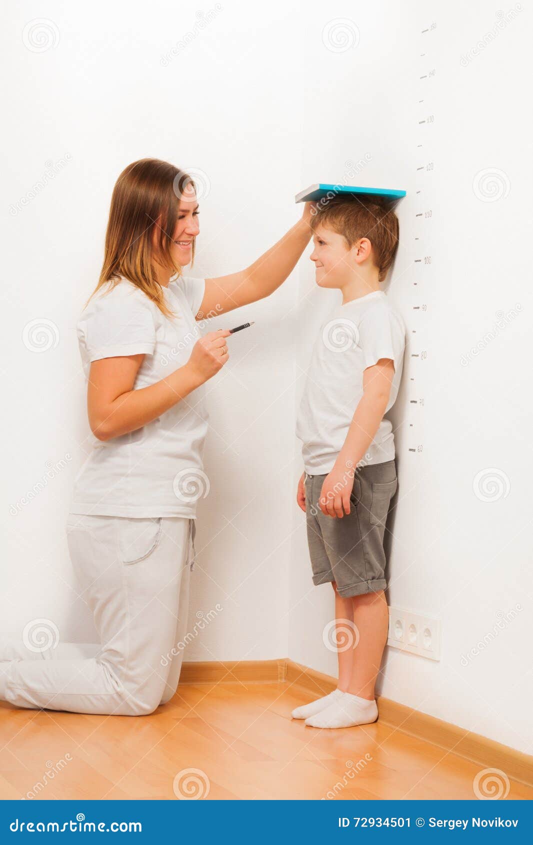 Checking Height Growth Chart Stock Photos - Free & Royalty-Free Stock ...