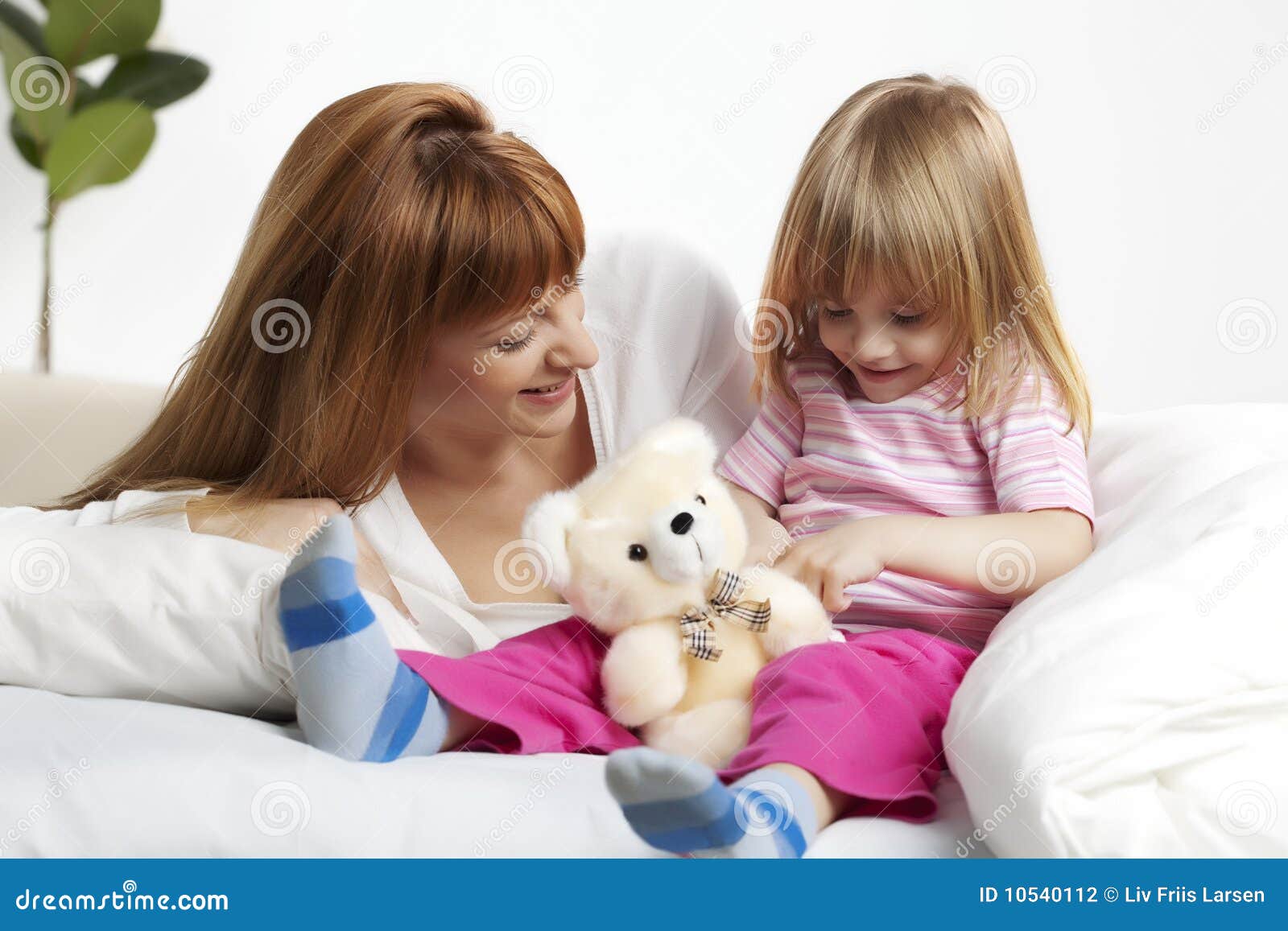 Mother child at bedtime stock photo. Image of bear, smiling - 10540112