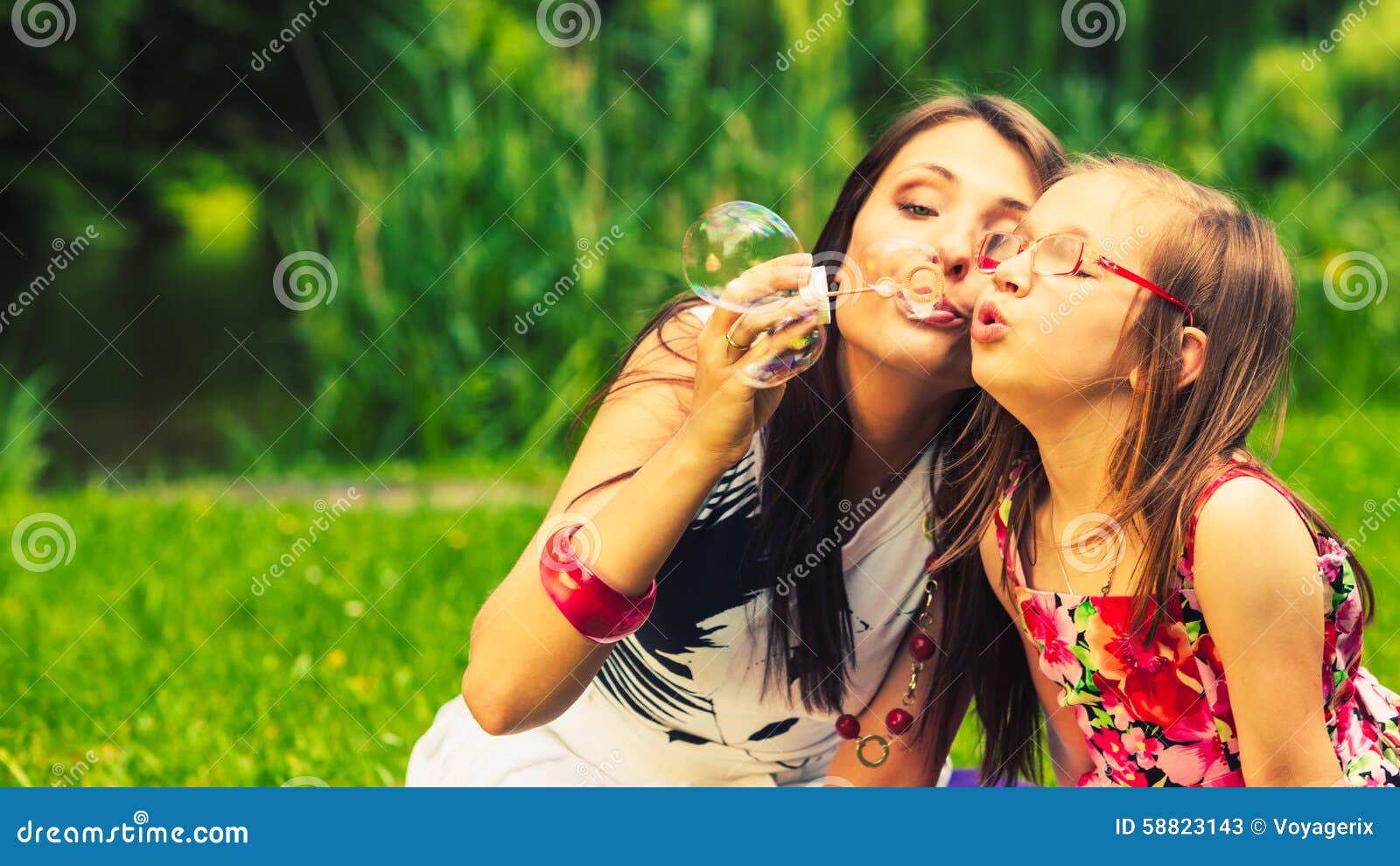 Mother and Child Blowing Soap Bubbles Outdoor. Stock Image - Image of ... Mother and Child Blowing Soap Bubbles Outdoor. Stock Image - Image of ...