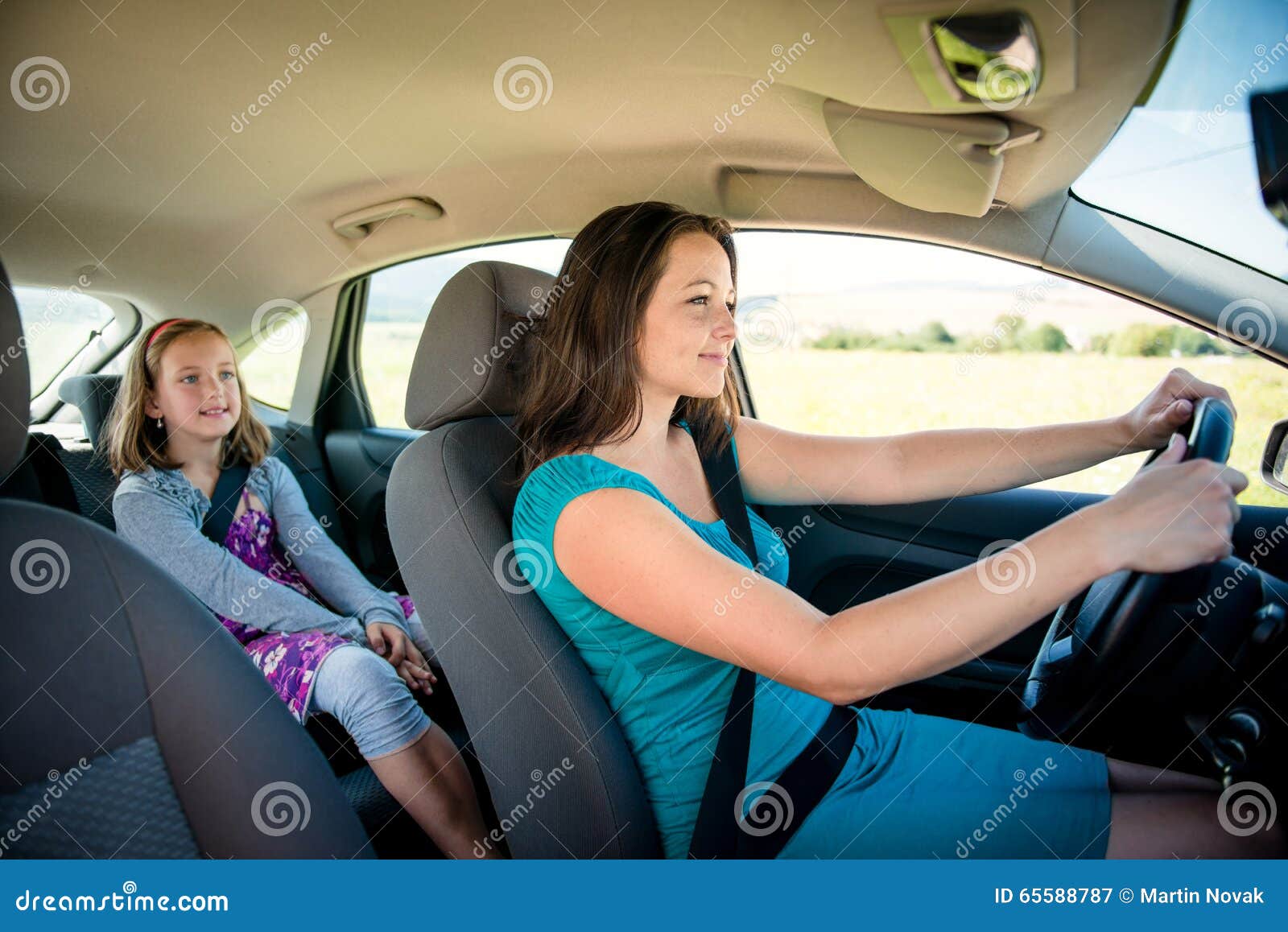 Mother and child in car stock image. Image of person - 65588787