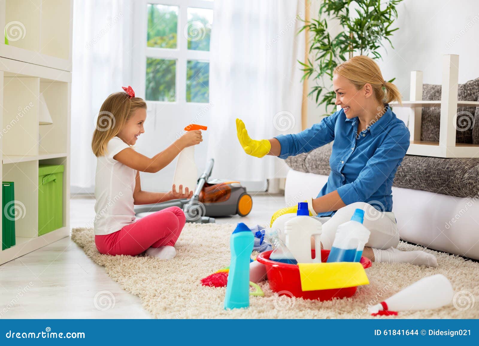 Child Cleaning Table In Kitchen With Rag. Royalty-Free Stock Image ...