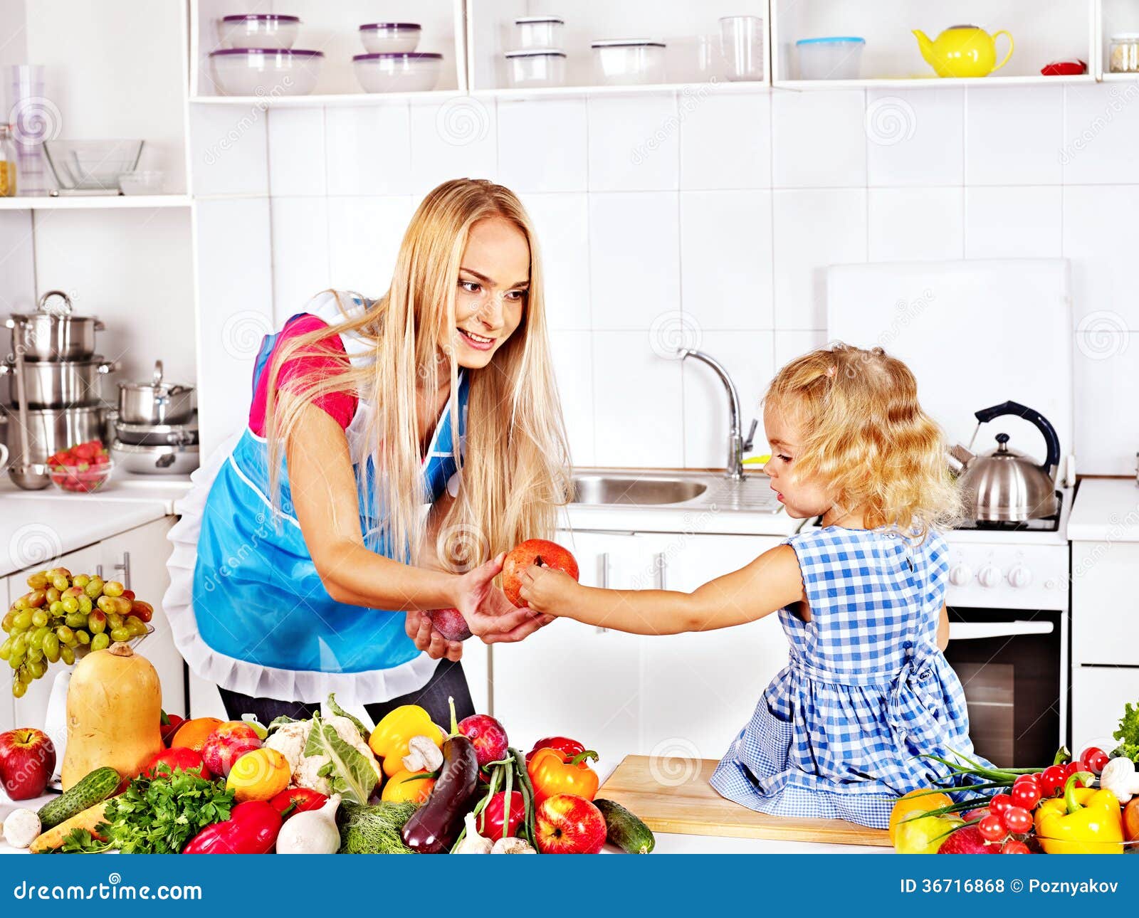 Mother and Child Cooking at Kitchen. Stock Photo - Image of mother ...