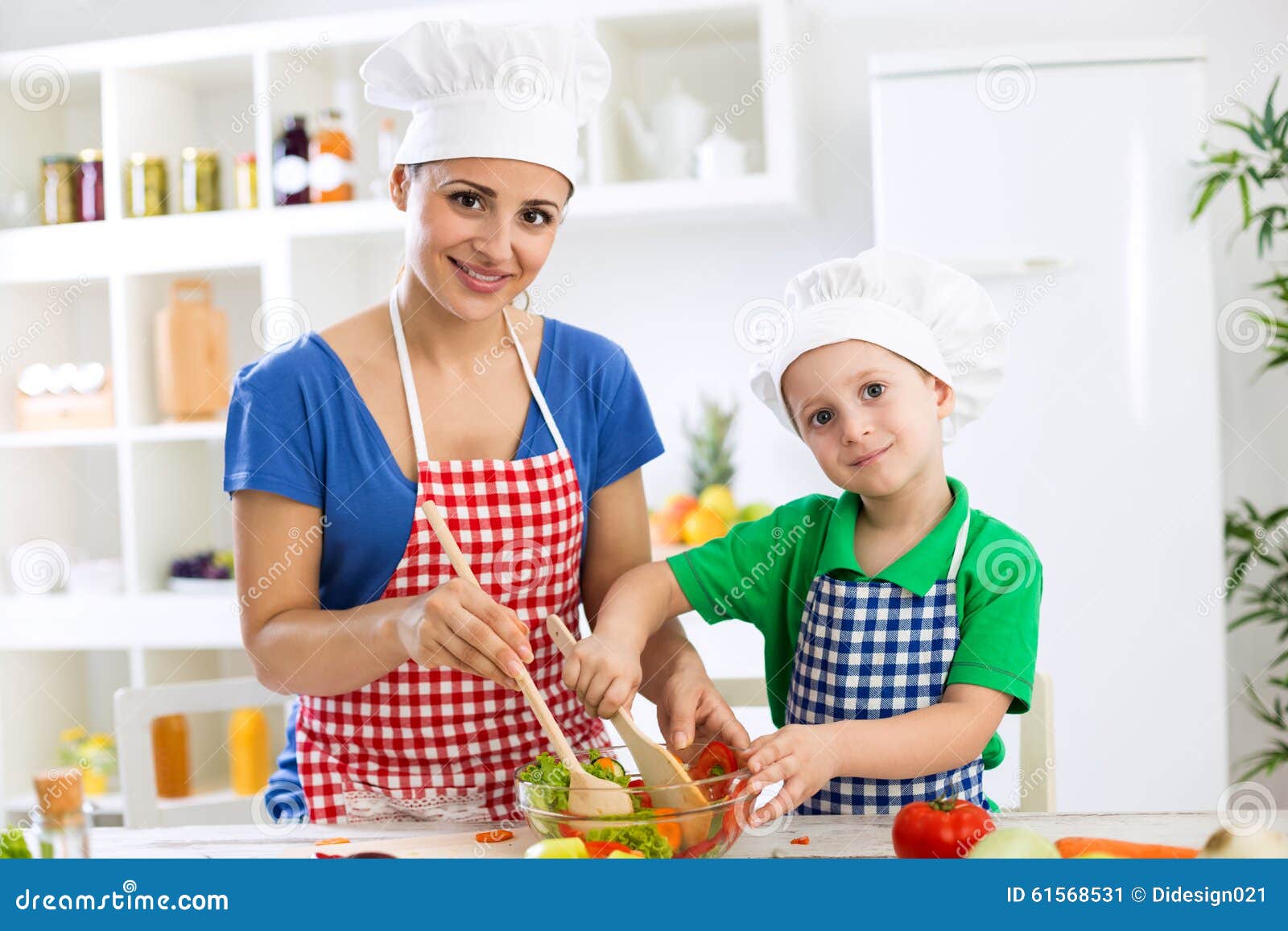 Mother and Child Cooking Together Stock Image - Image of green, bowl ...