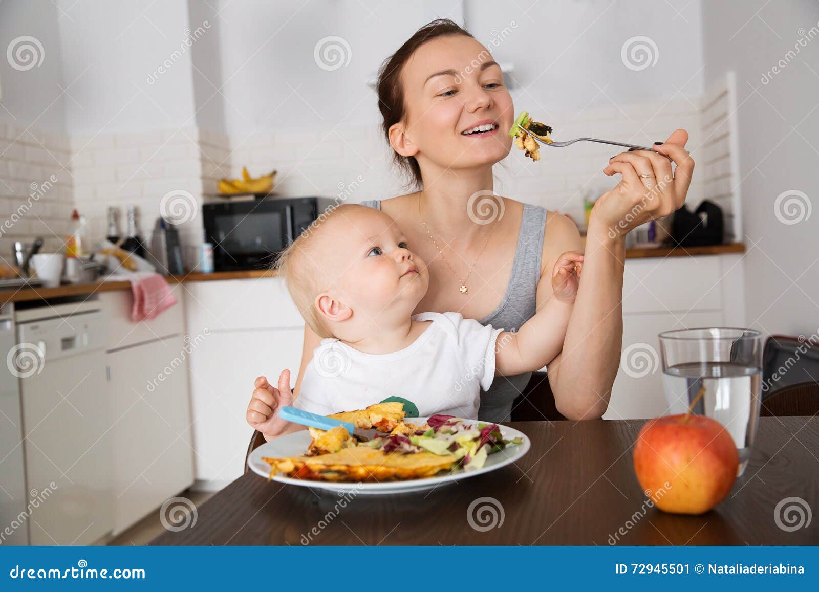 Mother and Child Eating Together Stock Image - Image of naughty, home ...