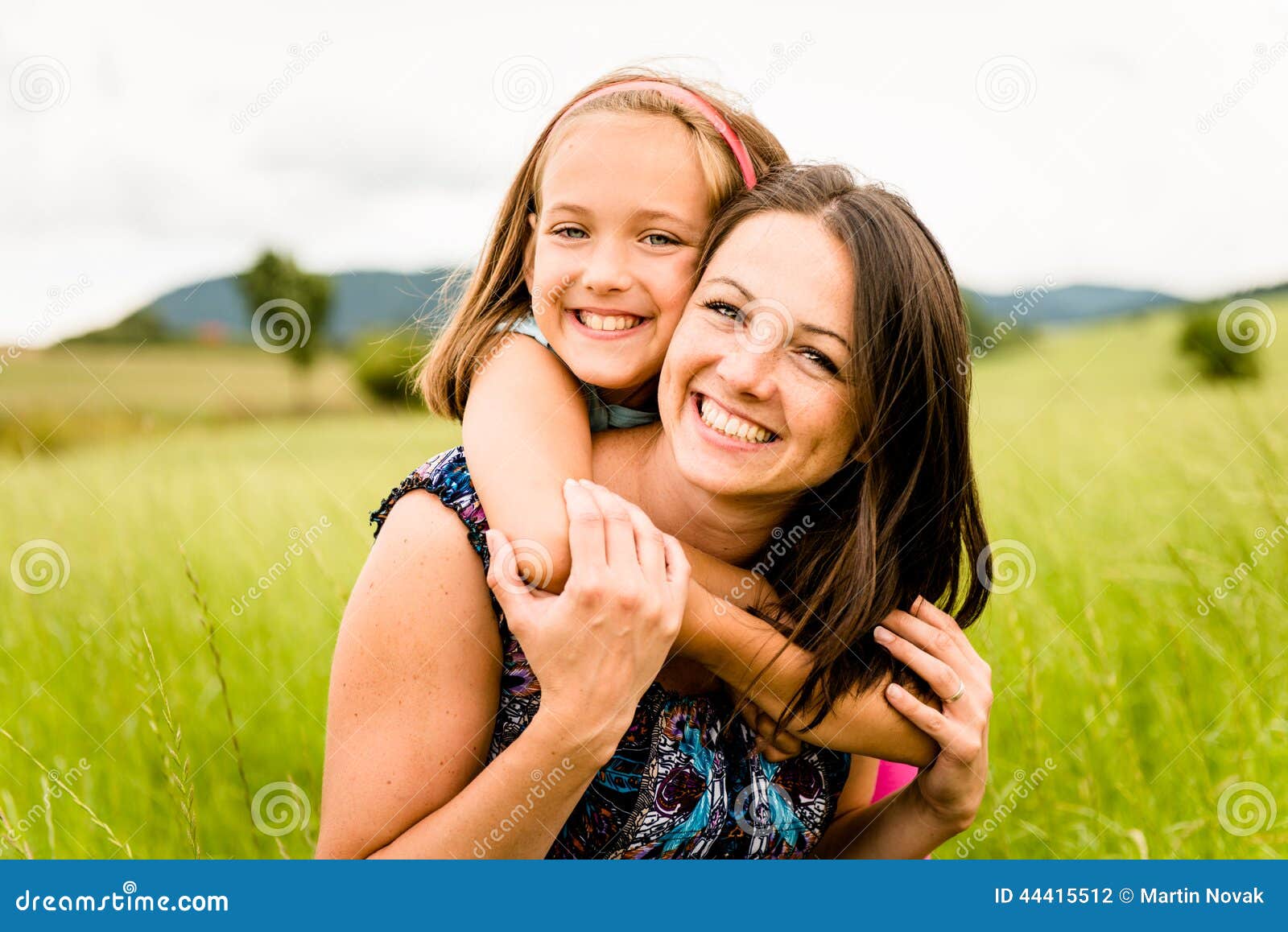 Mother and child hugging stock photo. Image of happiness - 44415512