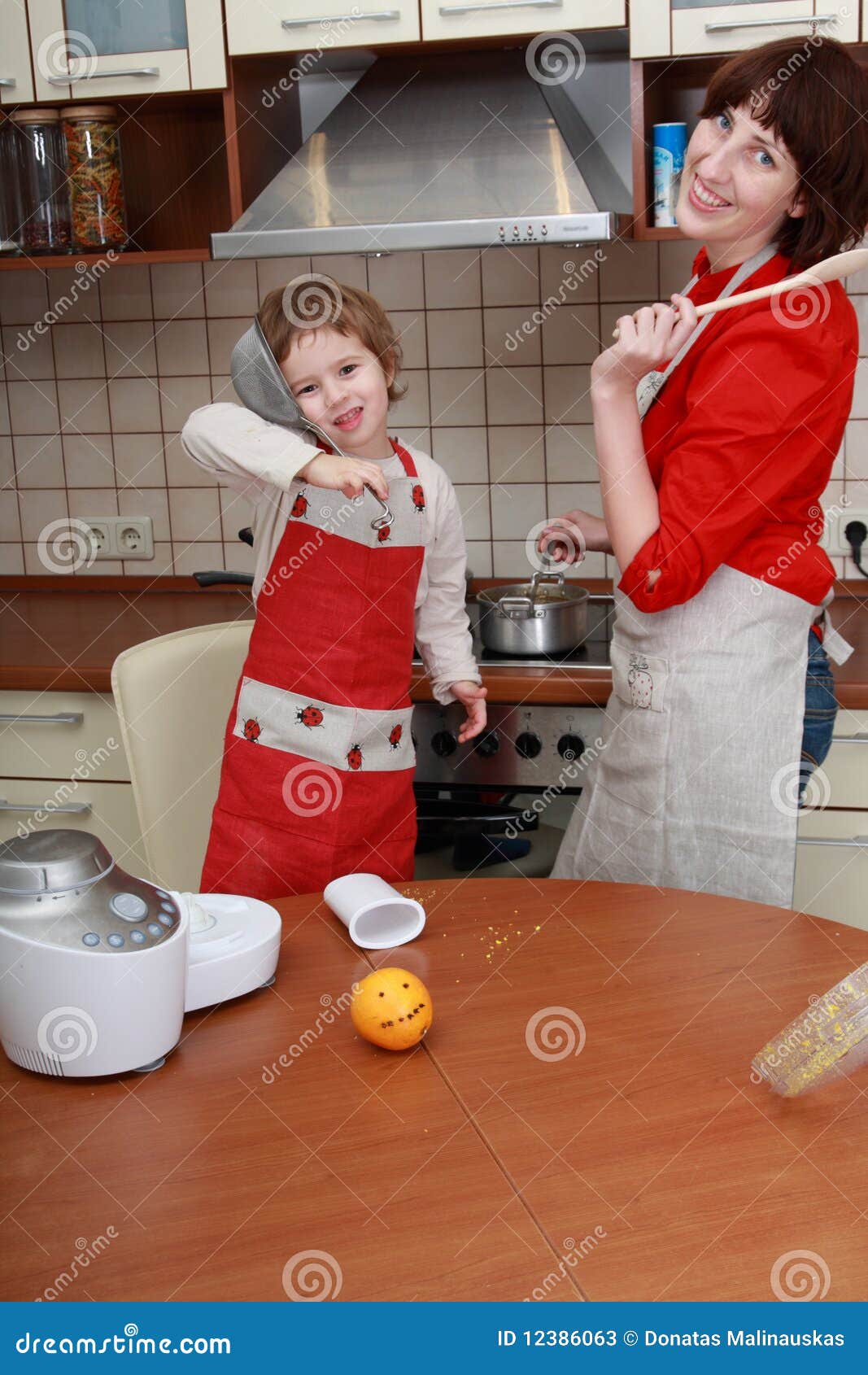 Mother and Child in the Kitchen Stock Image - Image of color, processor ...