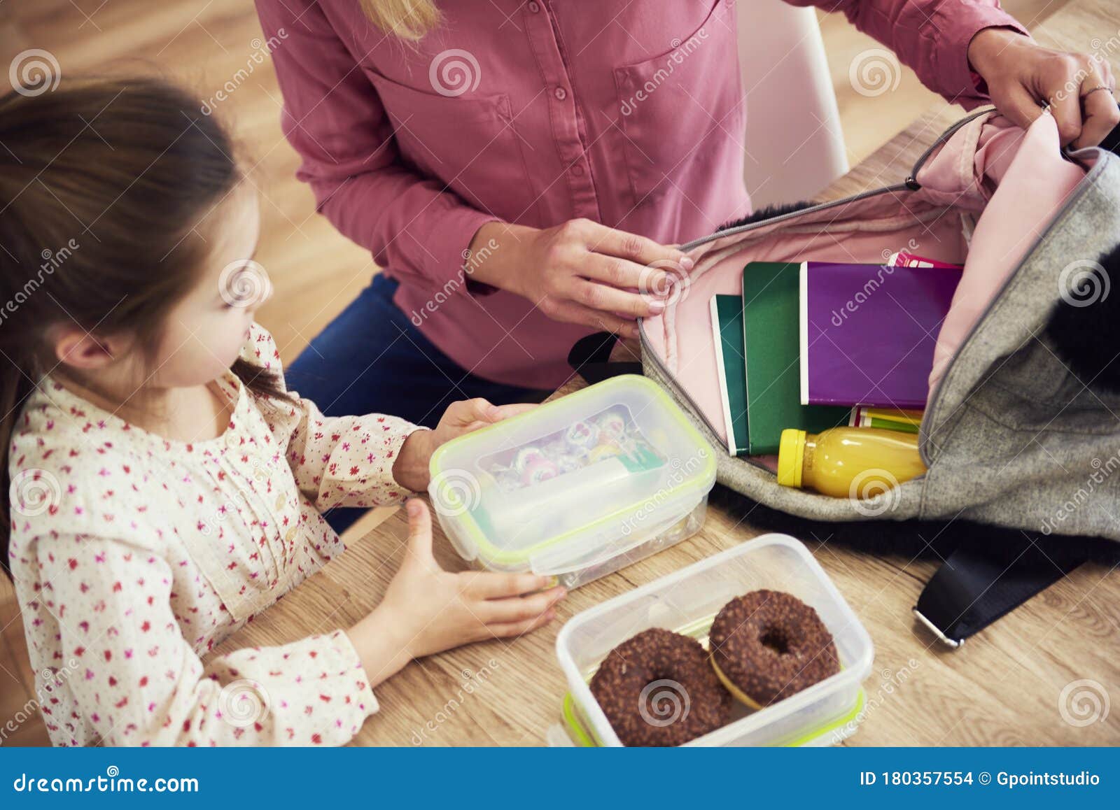Mother and Child Packing Backpack for the School Stock Photo - Image of ...