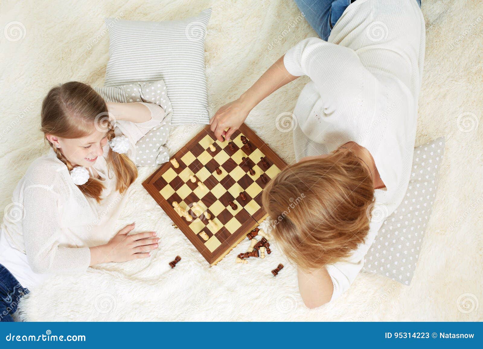 Mother and Child are Playing Chess while Spending Time Together Stock ...